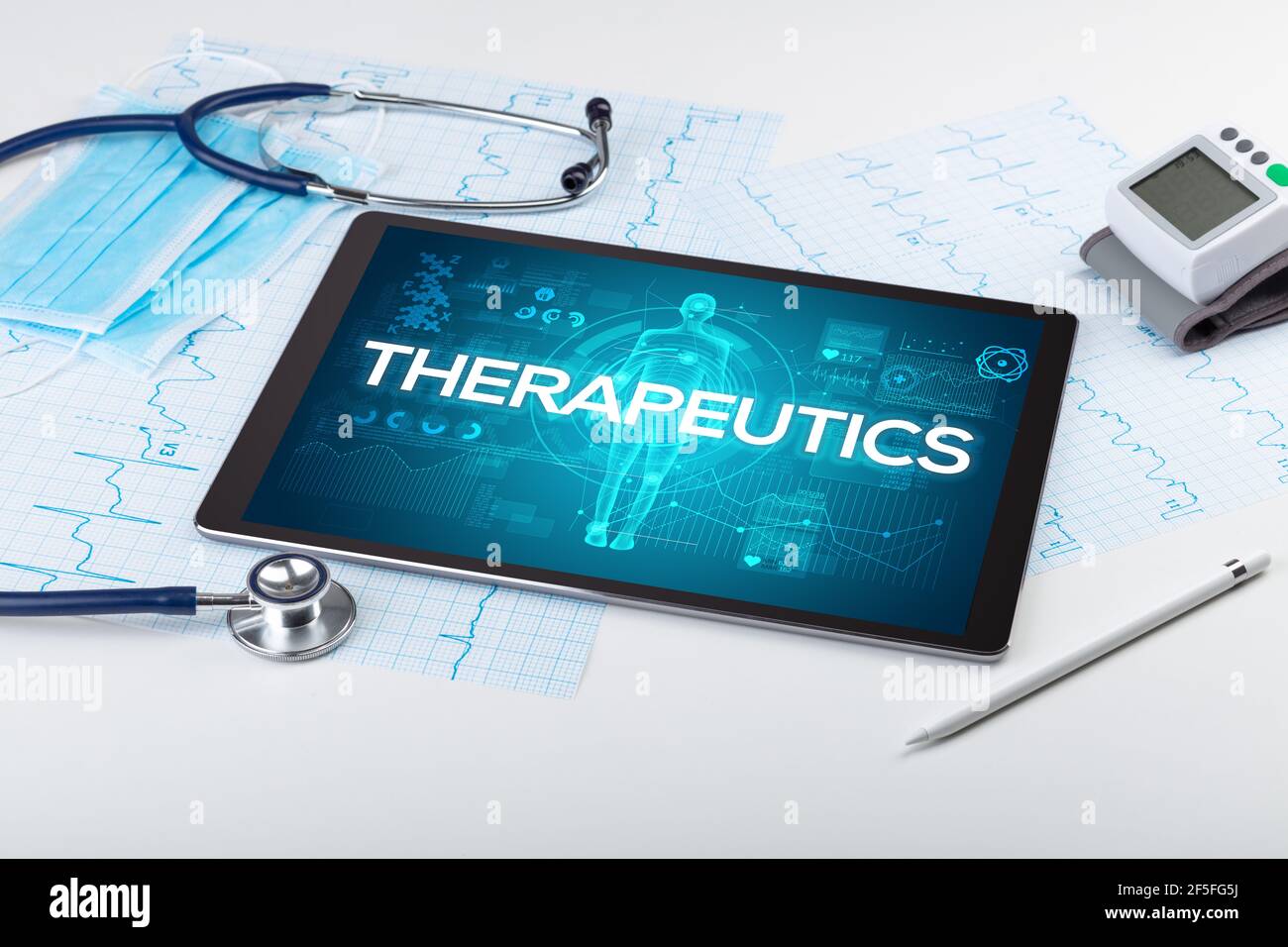 Tablet pc and doctor tools Stock Photo - Alamy