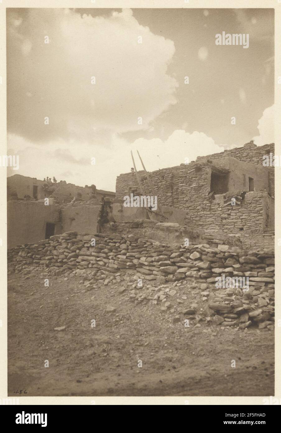 Man Seated on Pueblo Wall. A.C. Vroman (American, 1856 - 1916 Stock ...
