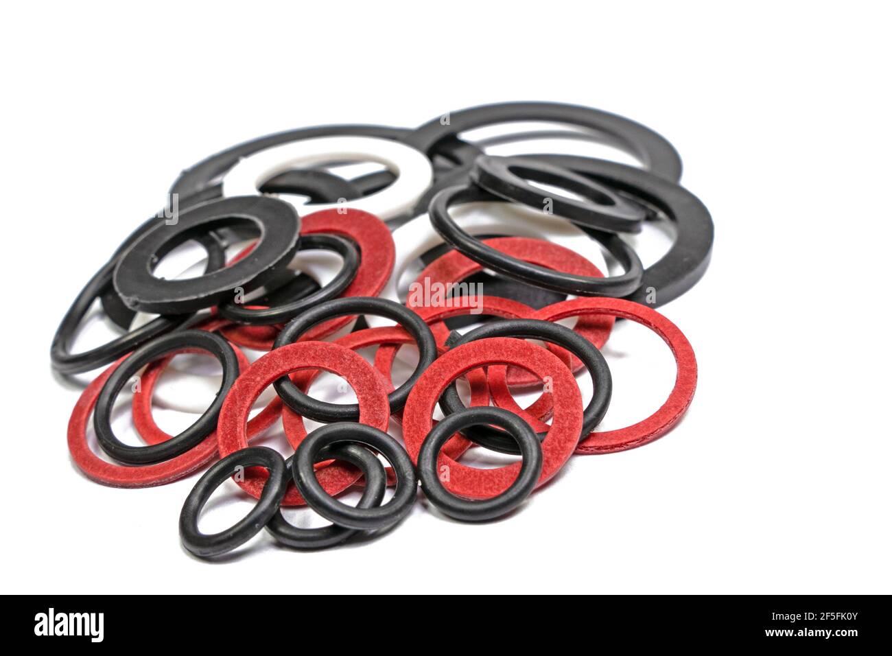 Various sealing rings against a white background Stock Photo - Alamy