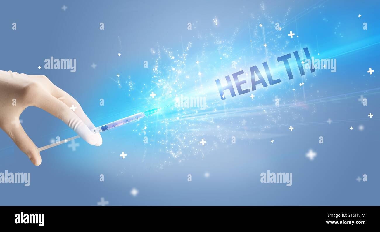 Syringe, medical injection in hand Stock Photo - Alamy