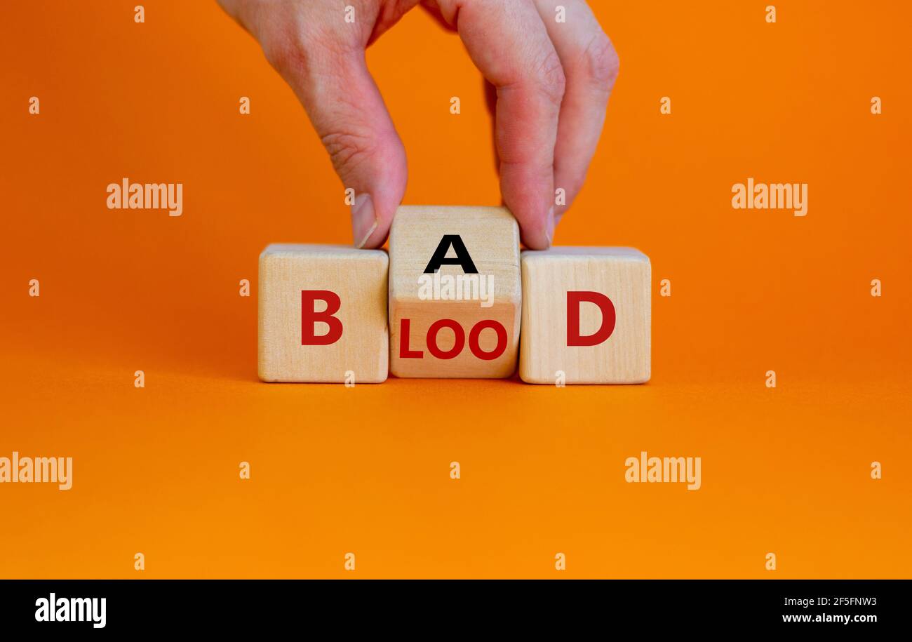 Breed bad blood symbol. Businessman turns cubes and changes the word ...