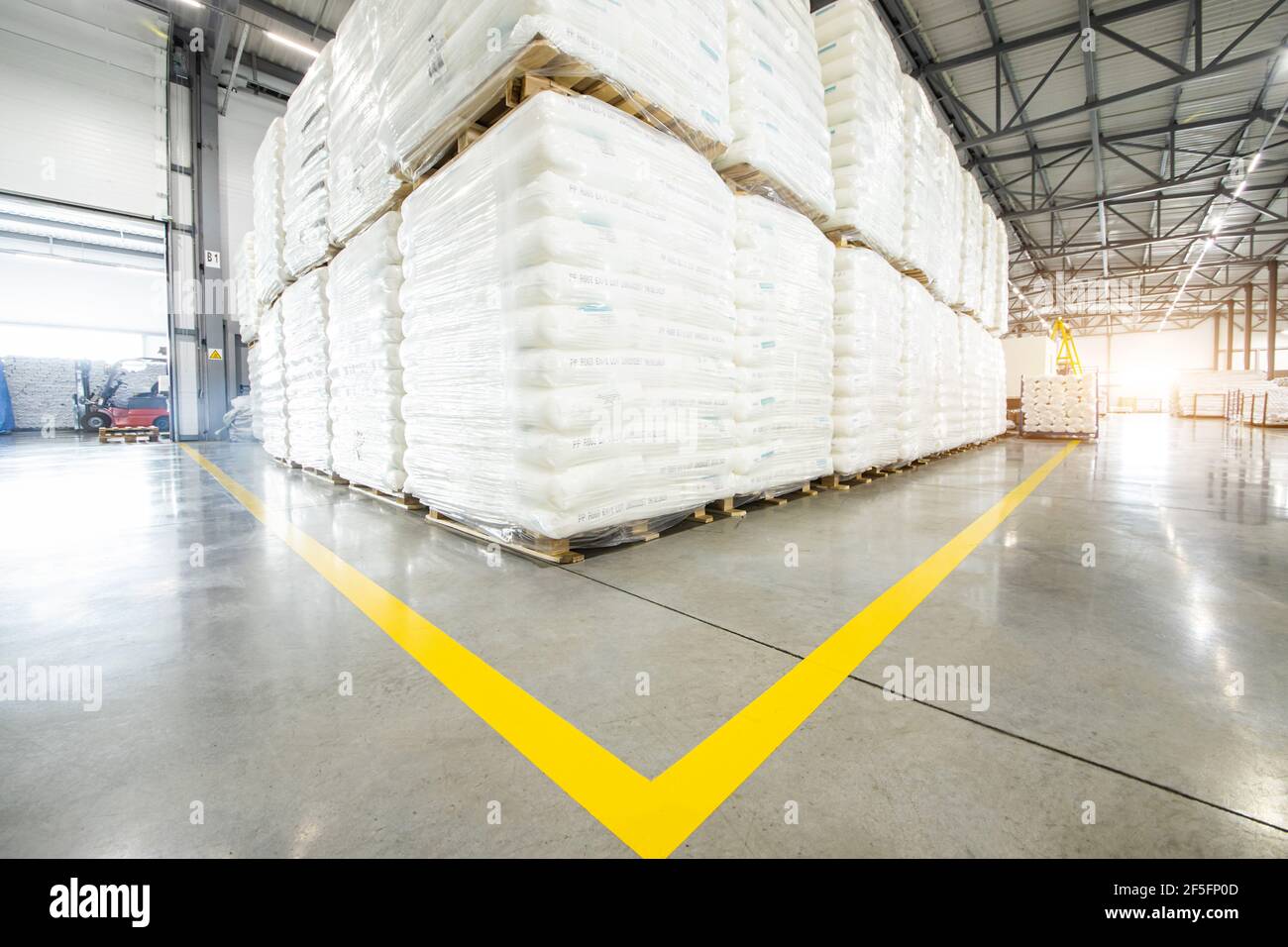 Spacious light interior of a large warehouse in a factory with special ...