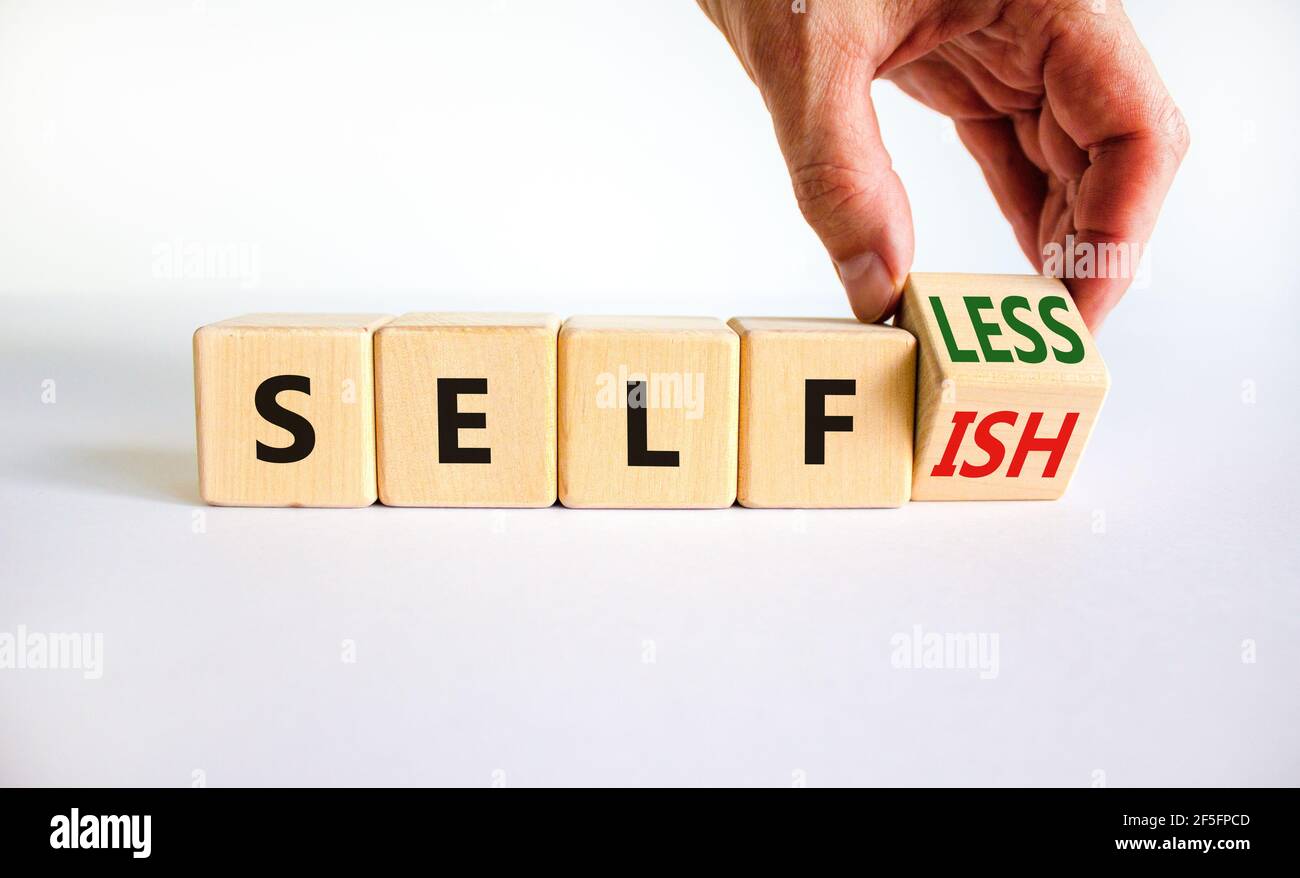 Selfish or selfless symbol. Businessman turns cubes and changes the ...