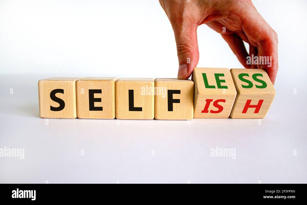 Selfish or selfless symbol. Businessman turns cubes and changes the ...