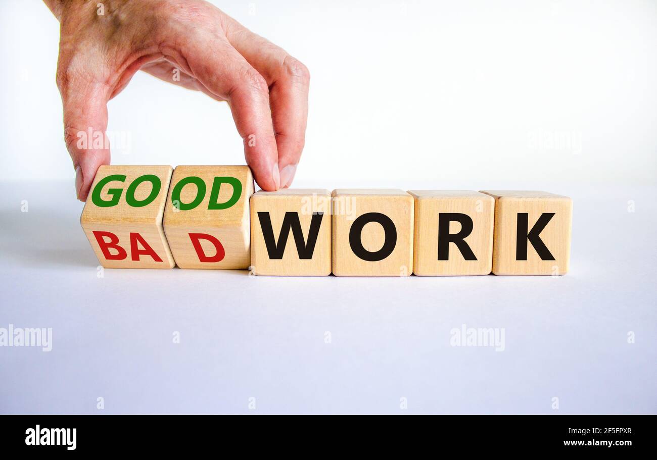 Good or bad work symbol. Businessman turns wooden cubes and changes ...