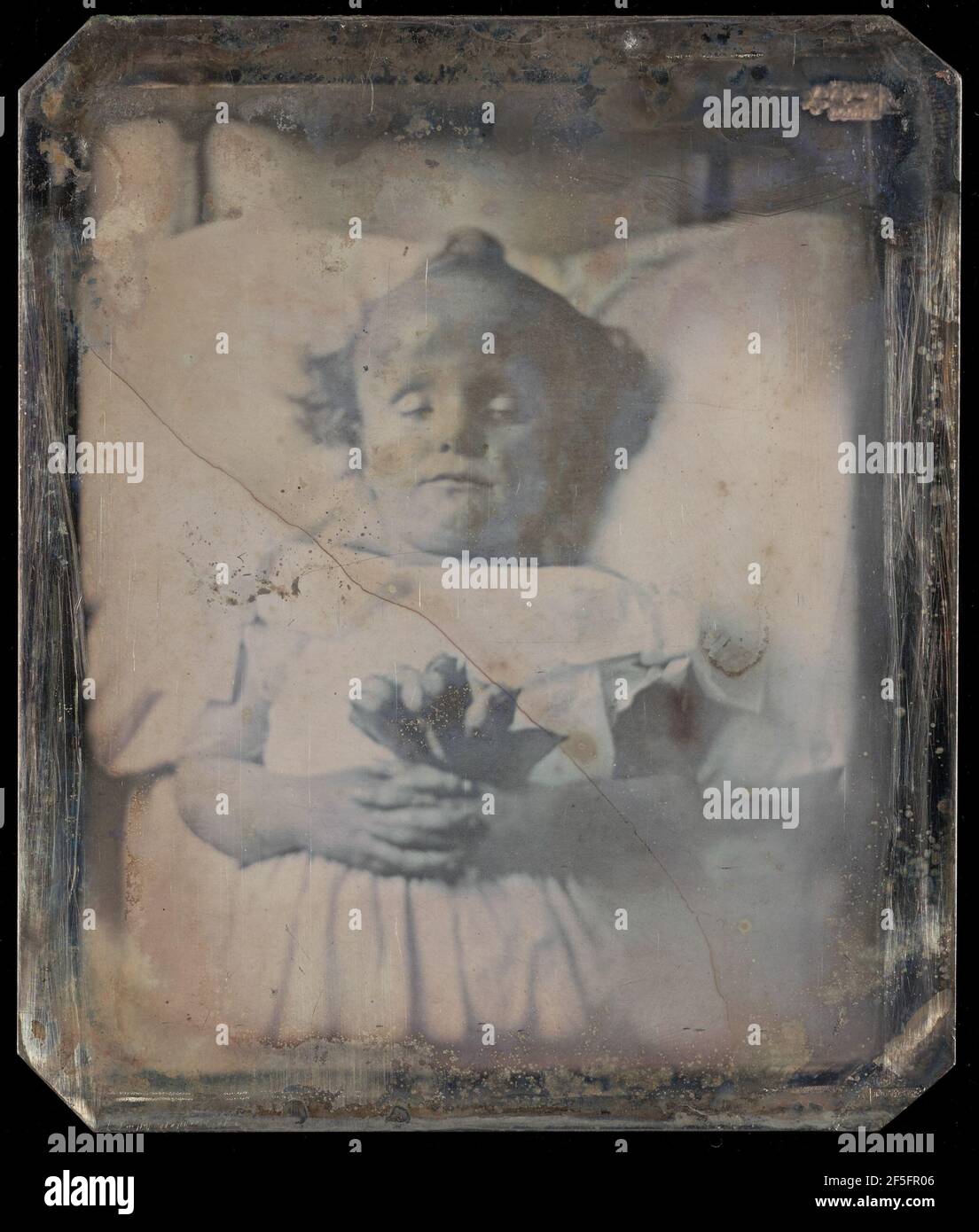 Postmortem Portrait of a Little Girl Holding a Small Bouquet of Roses ...