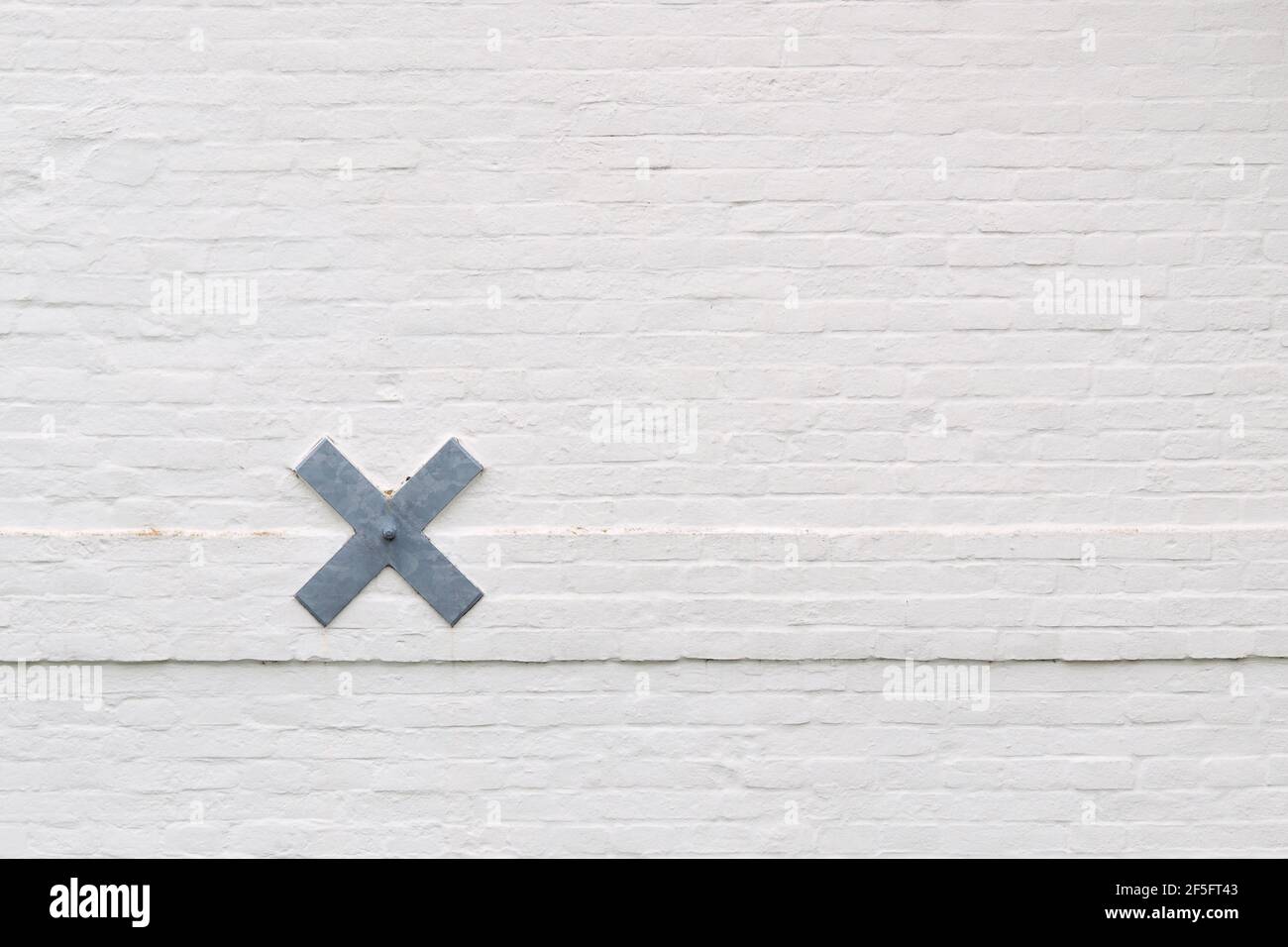 Wall detail with white painted bricks at a Dutch countryside house ...
