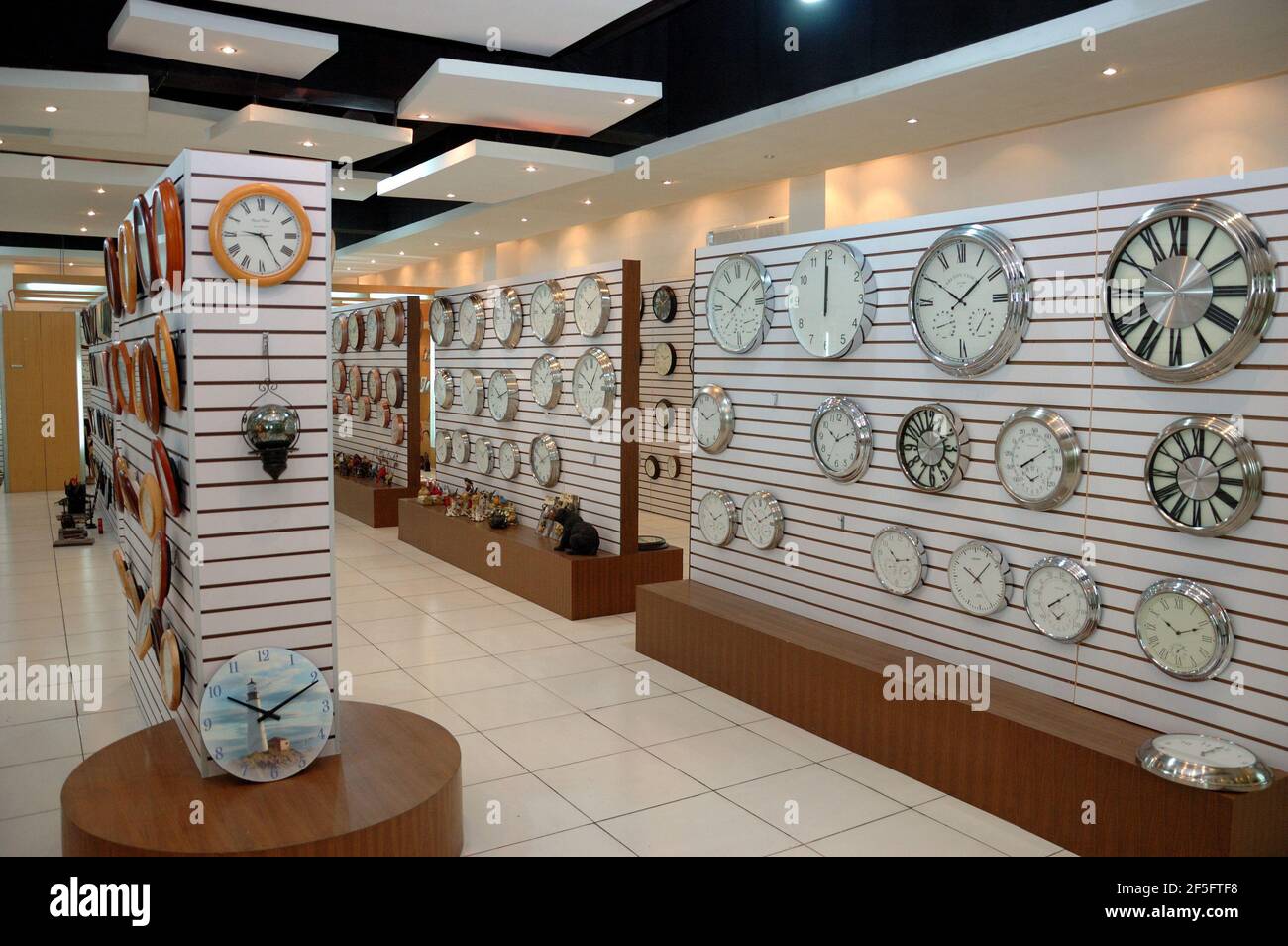 SHENZHEN, CHINA - 18th April.2015: clock factory in Shenzhen, China ...