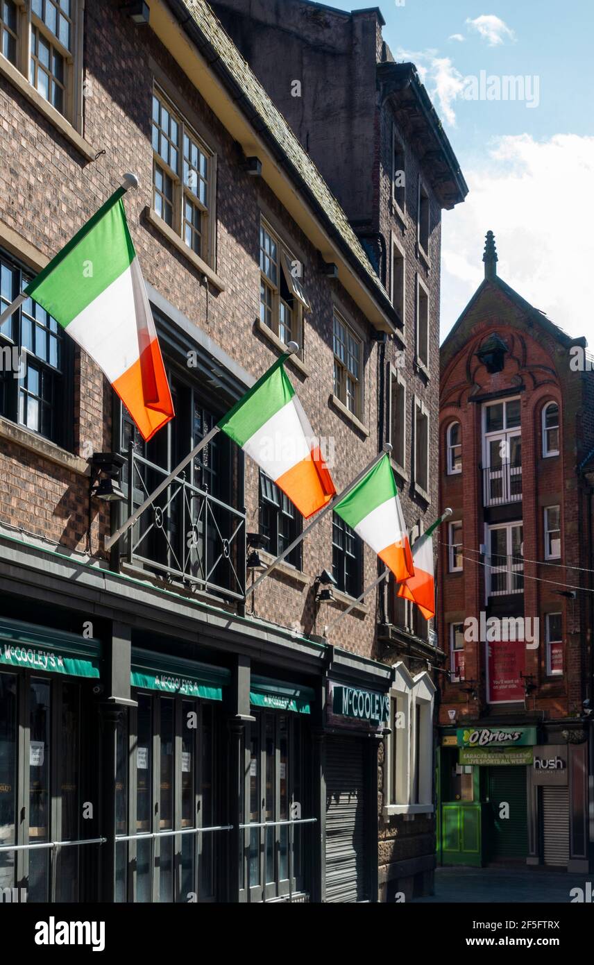 Four Irish flags flying outside McCooley's, a pool hall pub in ...