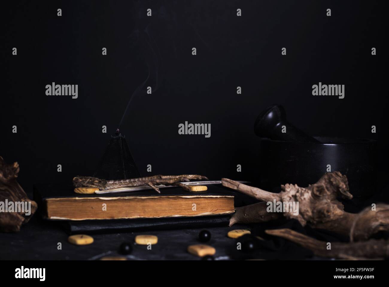 Still life with burning candles and pentagram circle background. Black ...