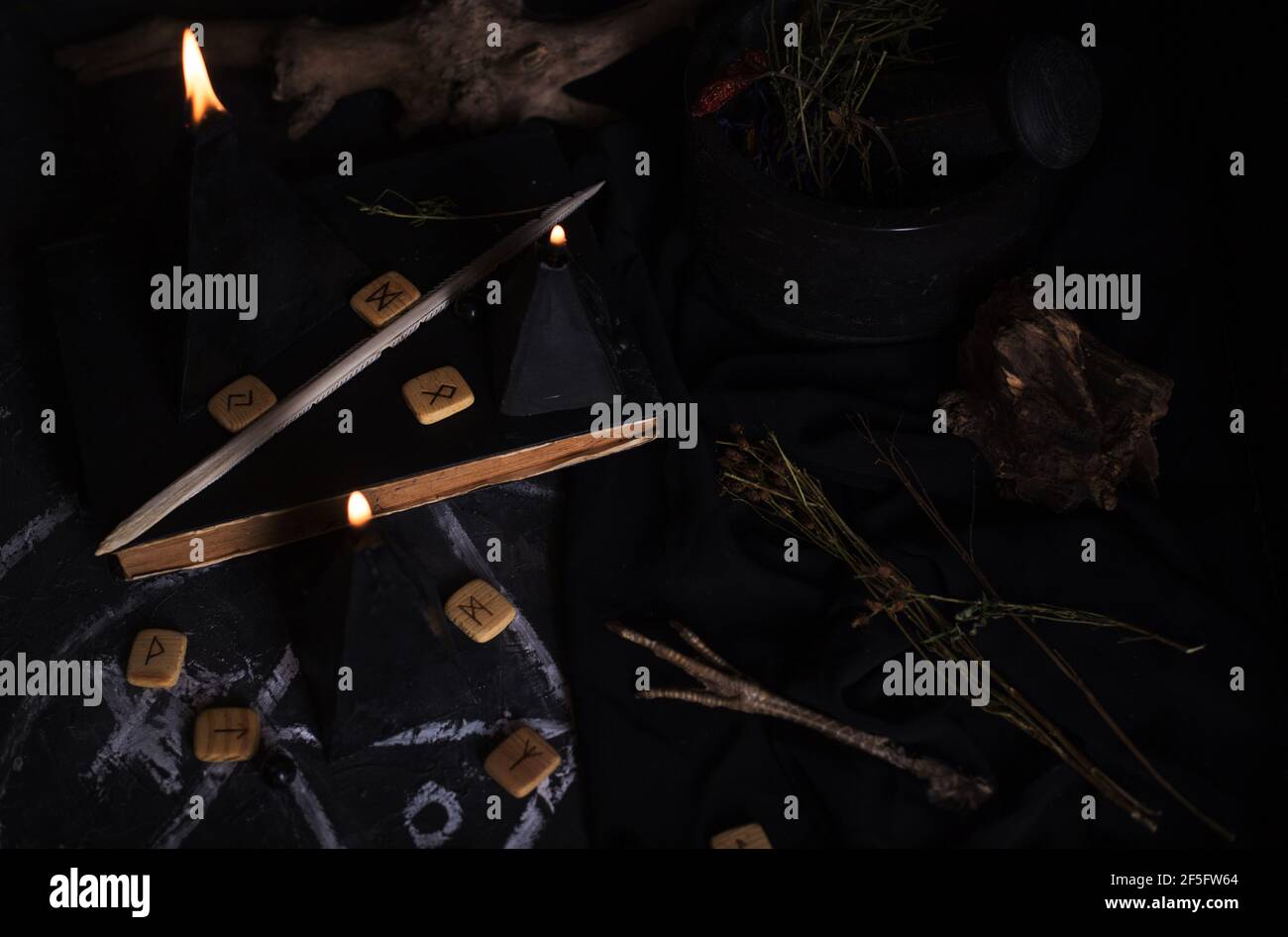 Still life with burning candles and pentagram circle background. Black ...