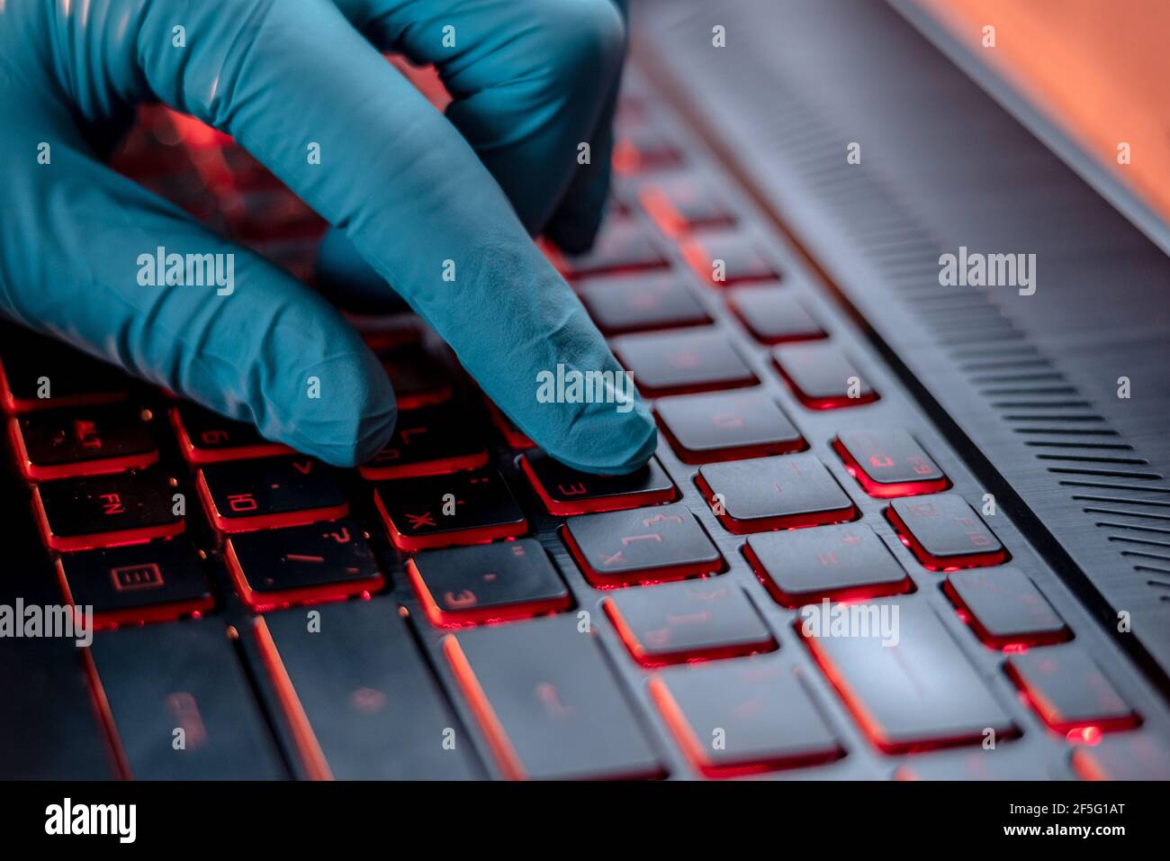 Computer keyboard hands gloves typing hi-res stock photography and ...