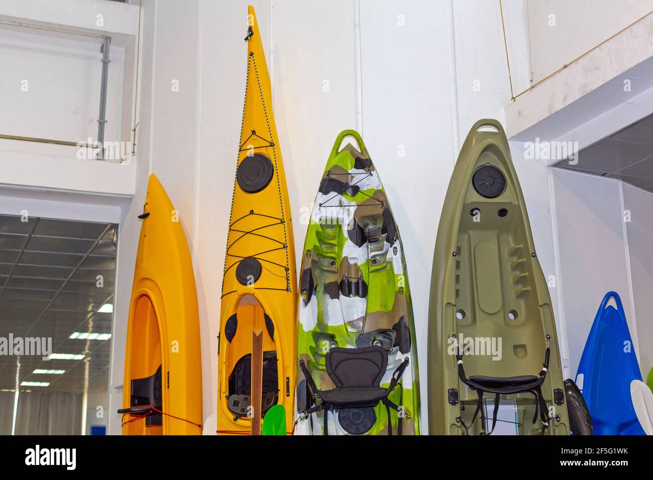 Various New Plastic Kayaks for Sport and Recreation Stock Photo - Alamy