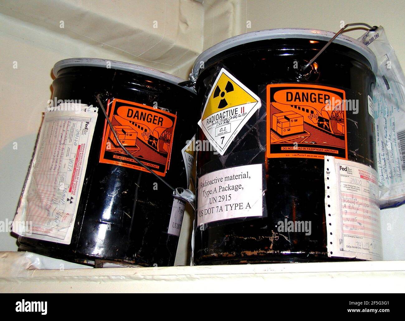 Radioactive HAZMAT labels on navy containers Stock Photo - Alamy