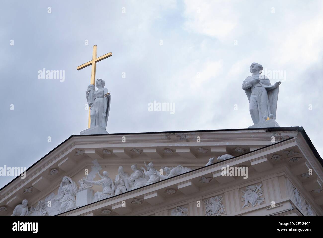 Statues adorn the roof-line of the cathedral, old town of Vilnius ...