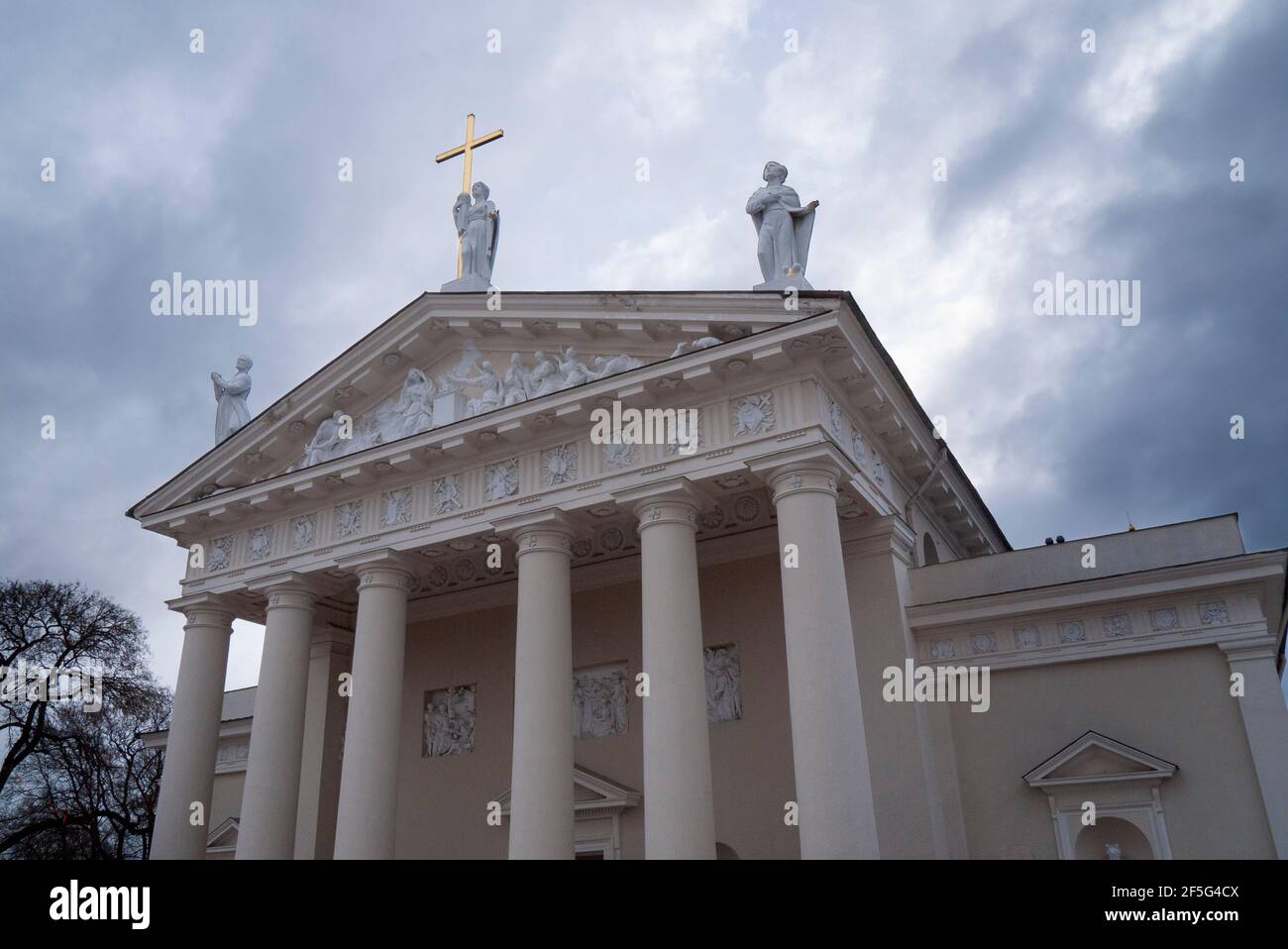 Statues adorn the roof-line of the cathedral, old town of Vilnius ...