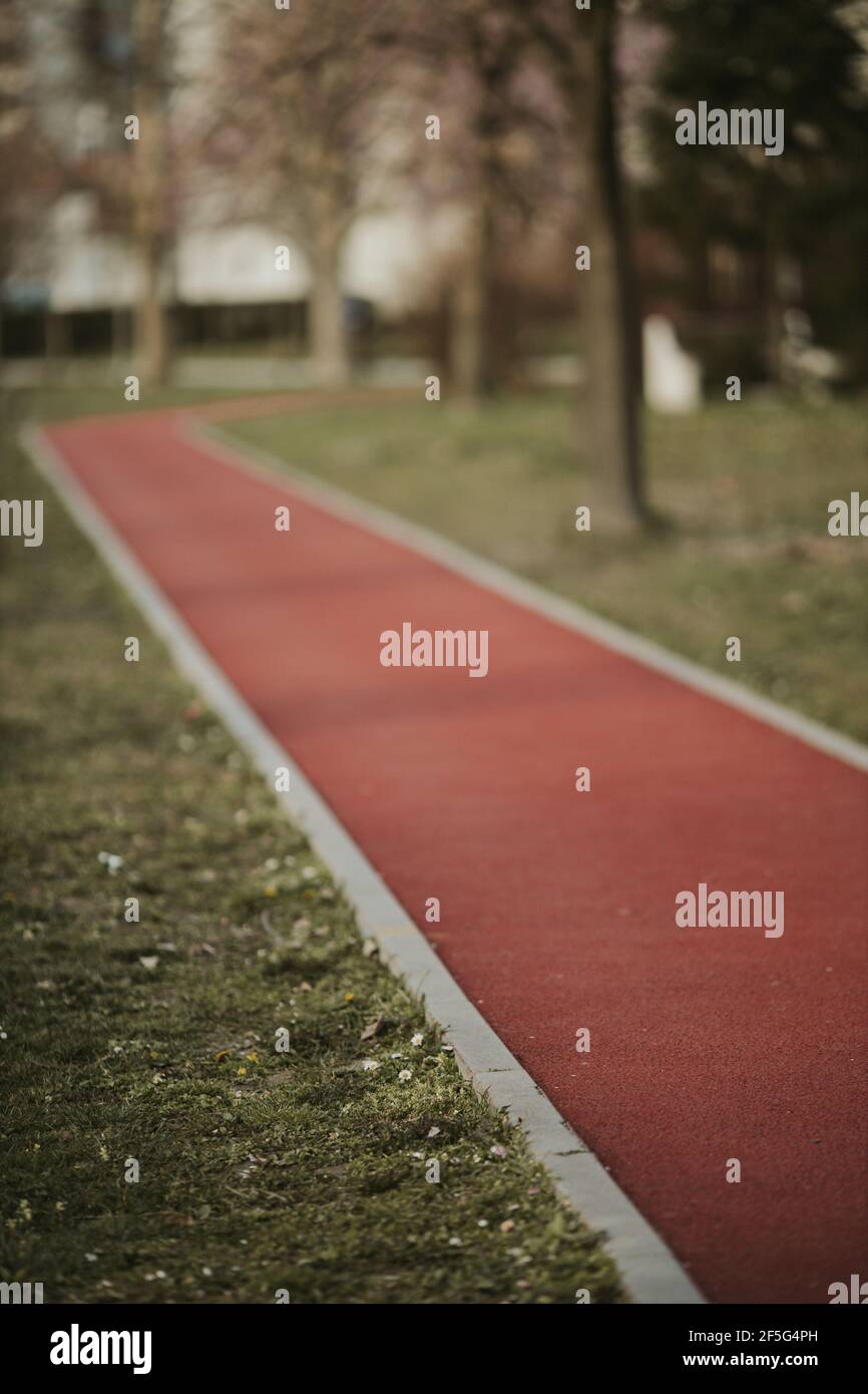 Pathway for running, walking or cycling in the park Stock Photo - Alamy