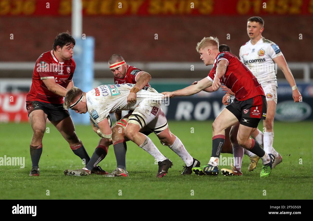 Exeter Chiefs' Richard Capstick is tackled by Gloucester's Lewis Ludlow ...
