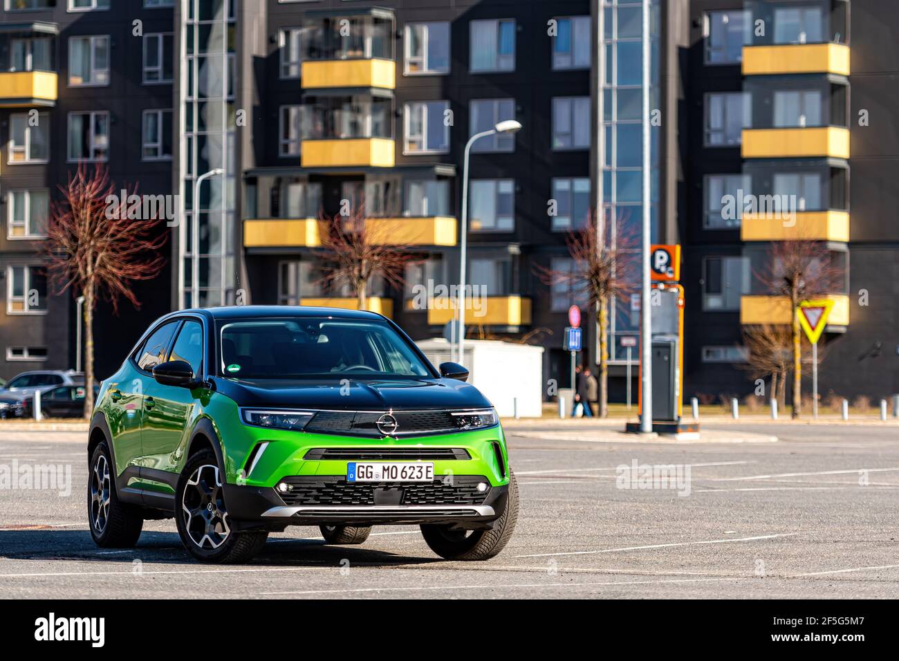 Riga, Latvia - 26 March, 2021: green electric vehicle Opel Mokka-e in ...