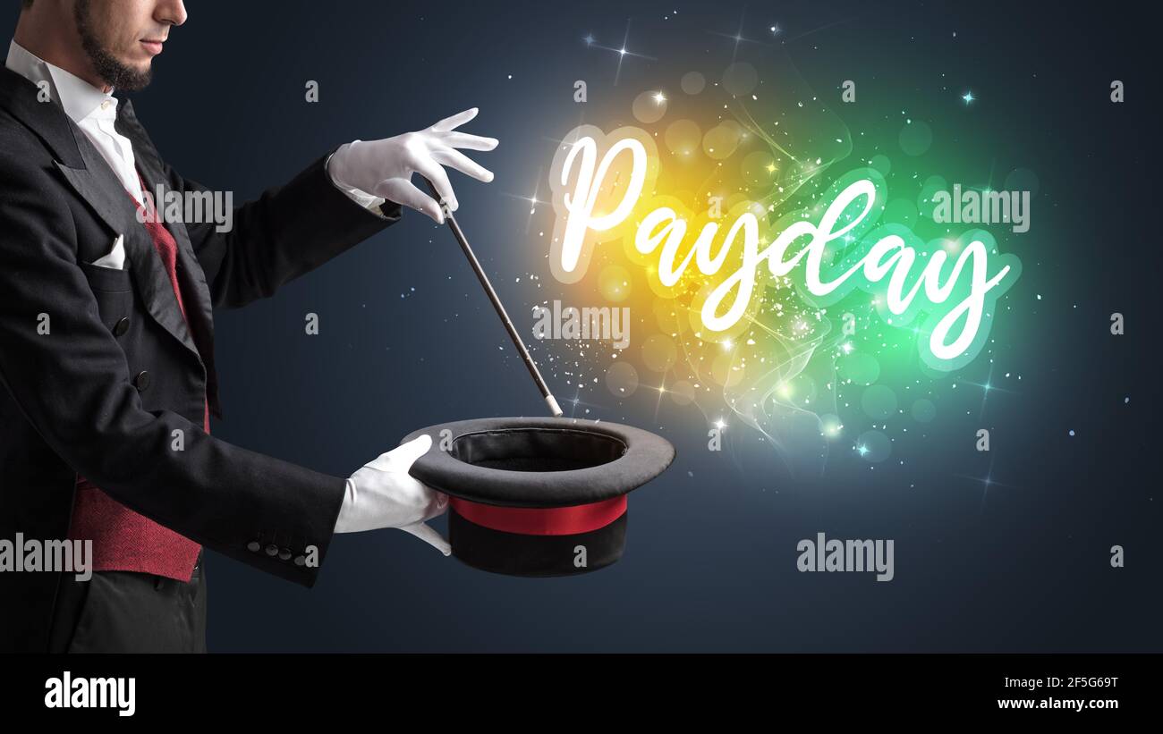 Young magician is showing magic trick Stock Photo - Alamy
