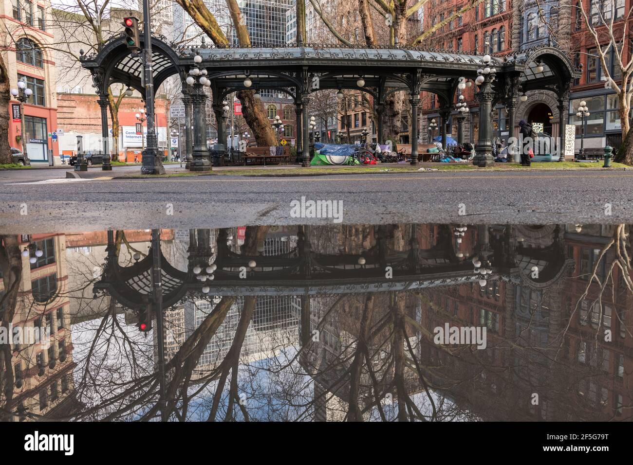 Seattle, USA. 22nd Mar, 2021. The historic pergola and homeless tents ...