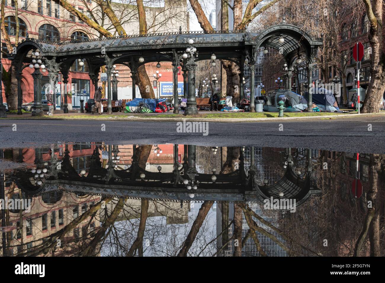 Seattle, USA. 22nd Mar, 2021. The historic pergola and homeless tents ...