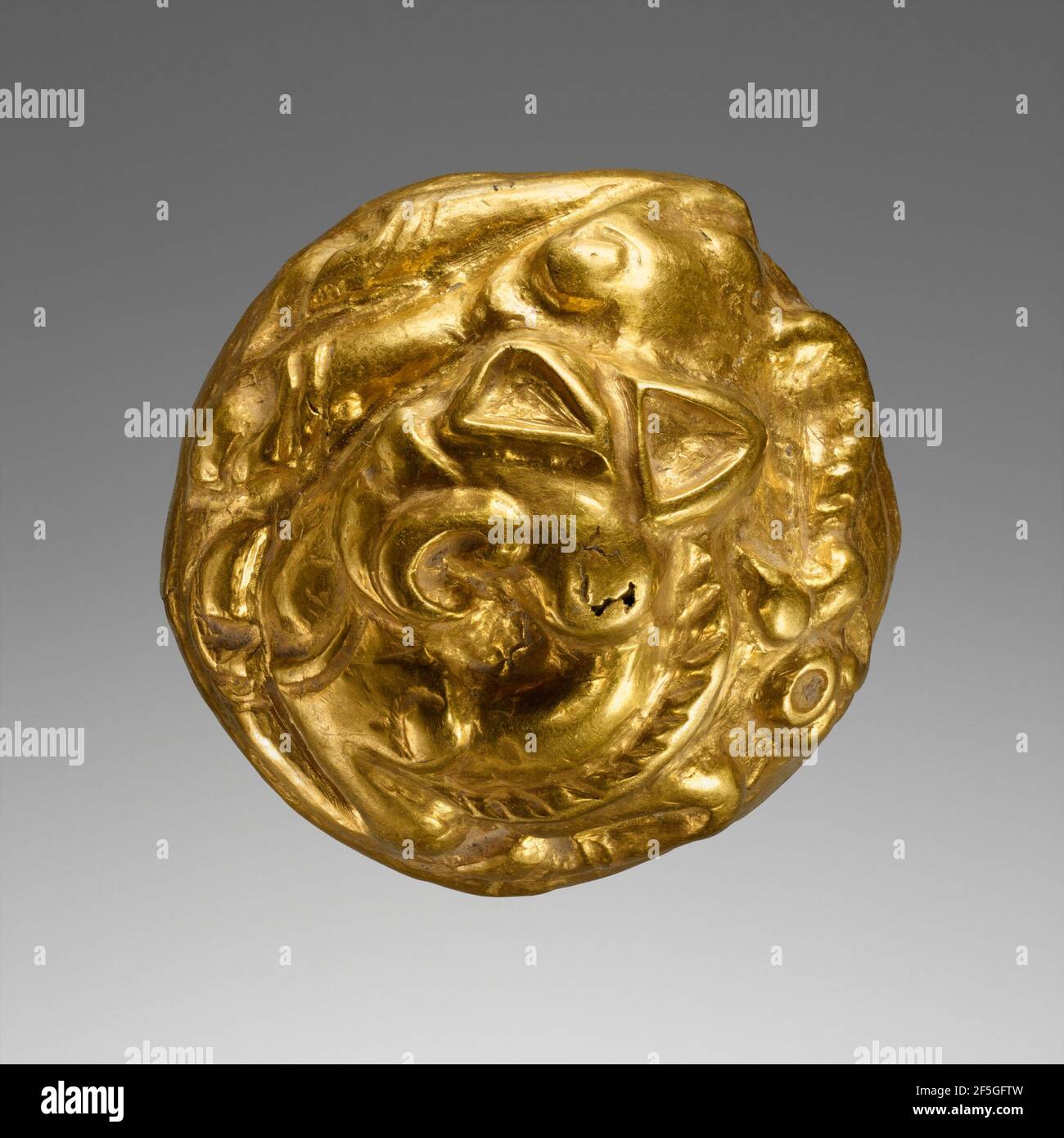 Button with Curled Griffin (Harness Ornament). Unknown Stock Photo - Alamy