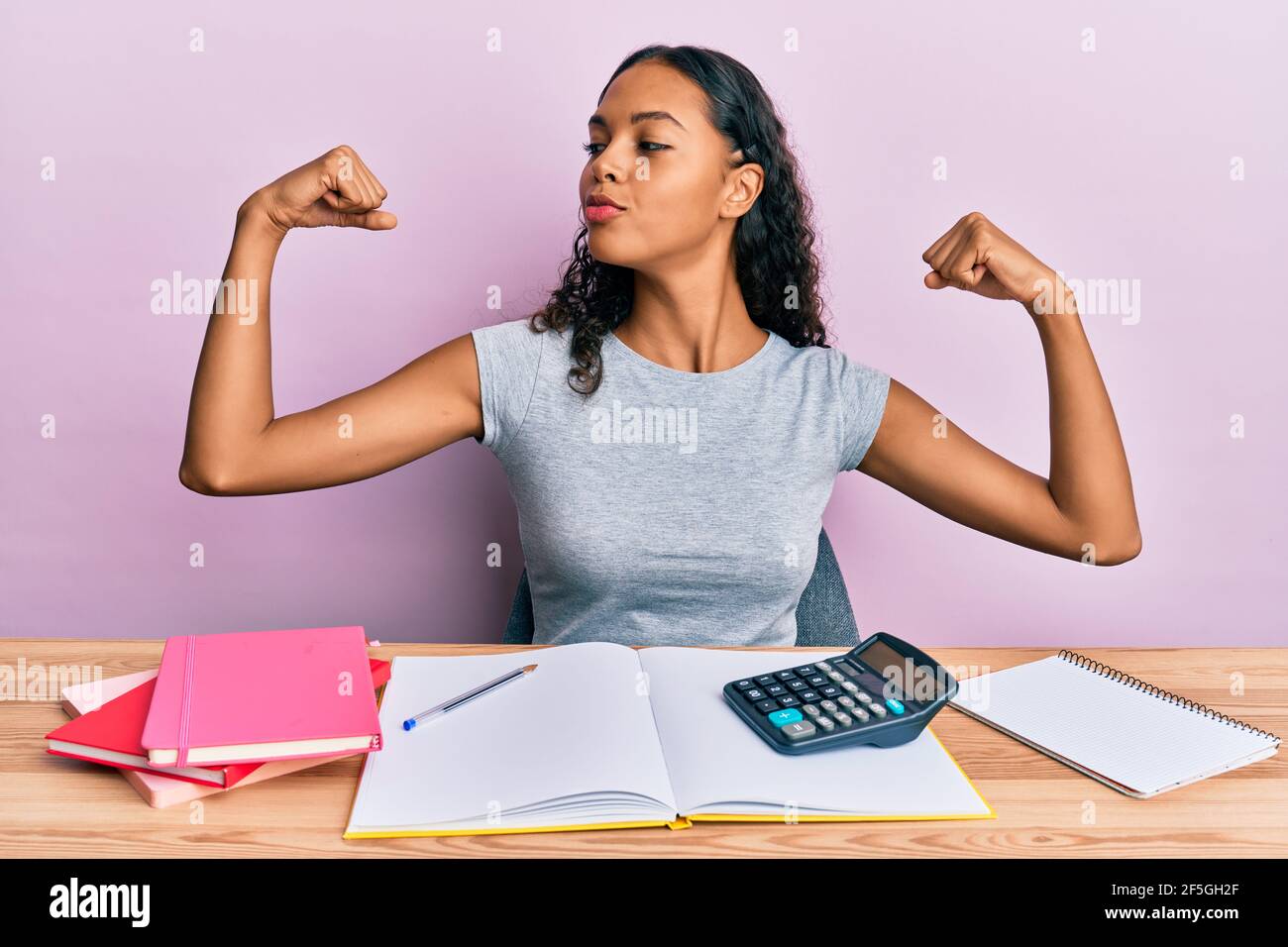 Young african american girl accountant working at the office showing ...