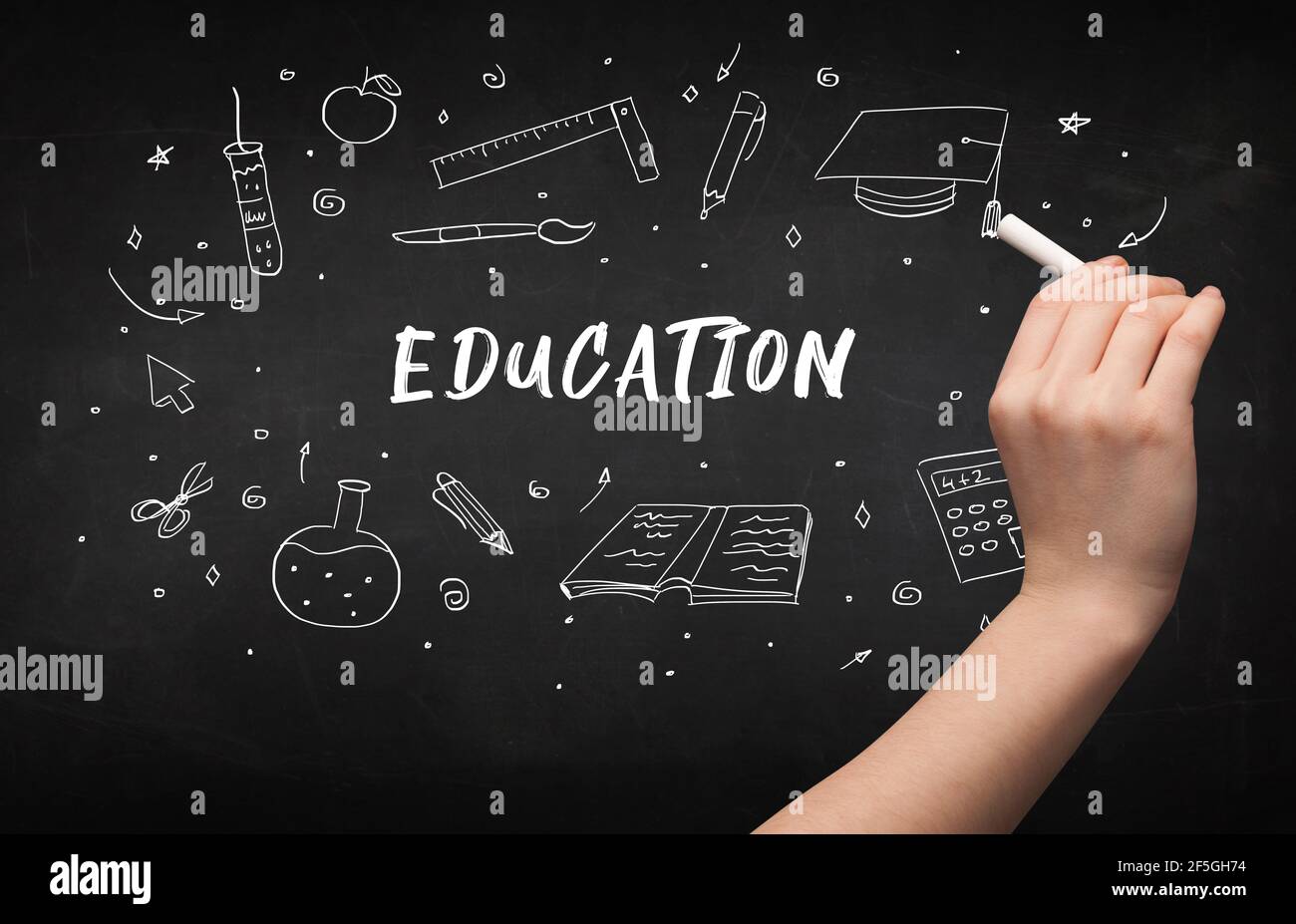 Hand drawing education concept Stock Photo - Alamy