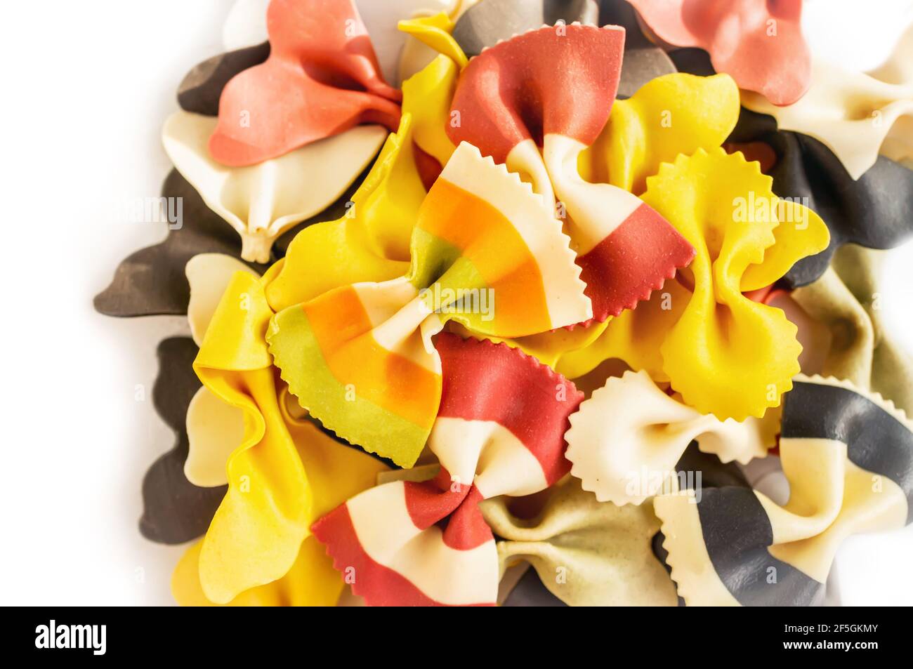 Assorted different colors of farfalle pasta. Multicolored farfalle ...