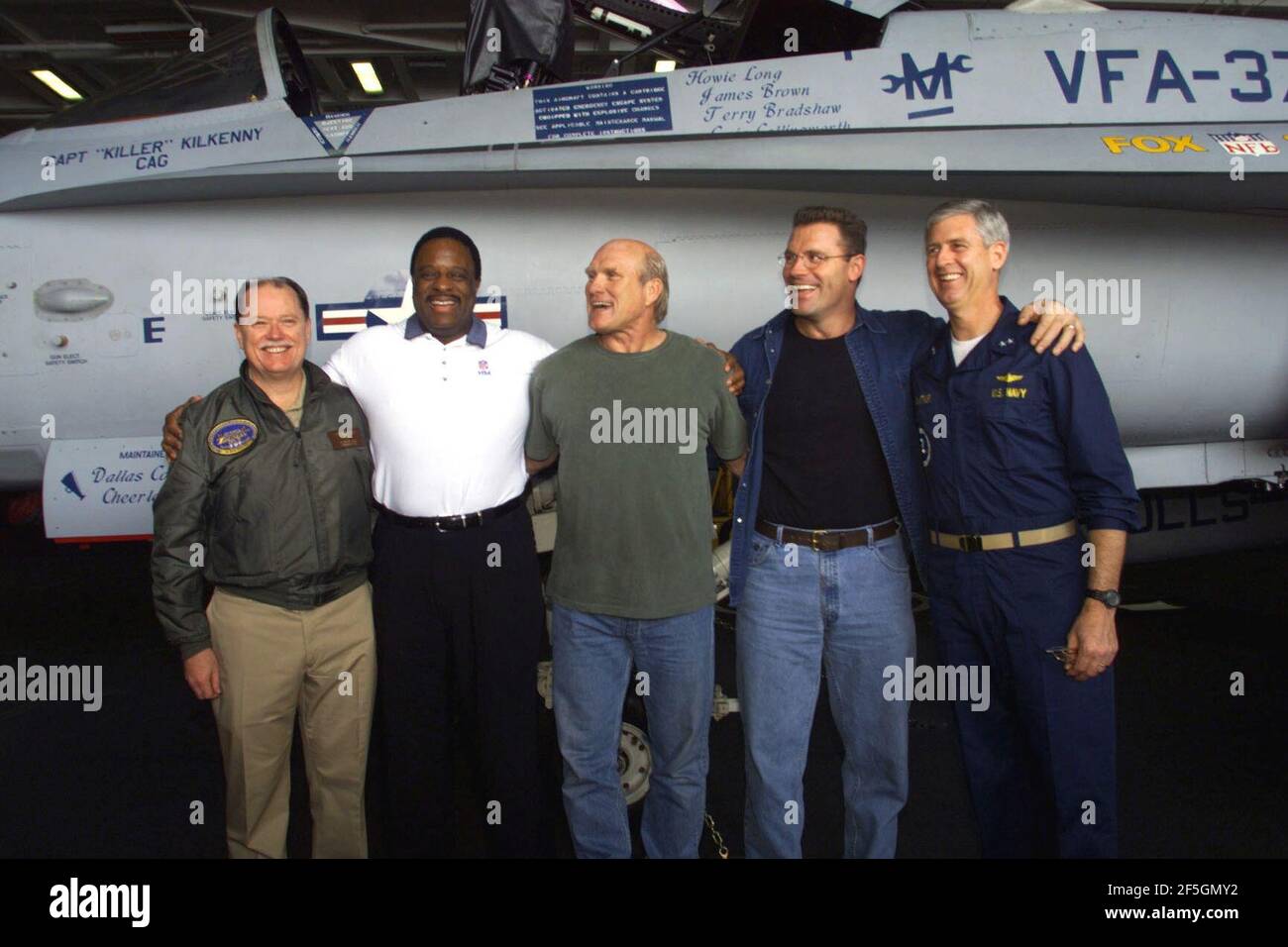 Rear Adm. James D. McArthur Jr. (right) and Capt. David L. Logsdon (far ...