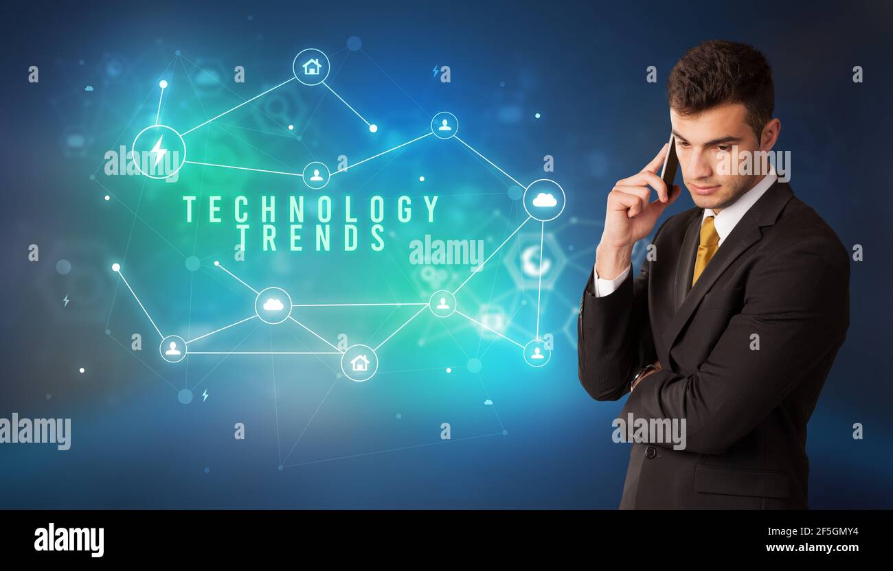 Businessman thinking about technology Stock Photo - Alamy