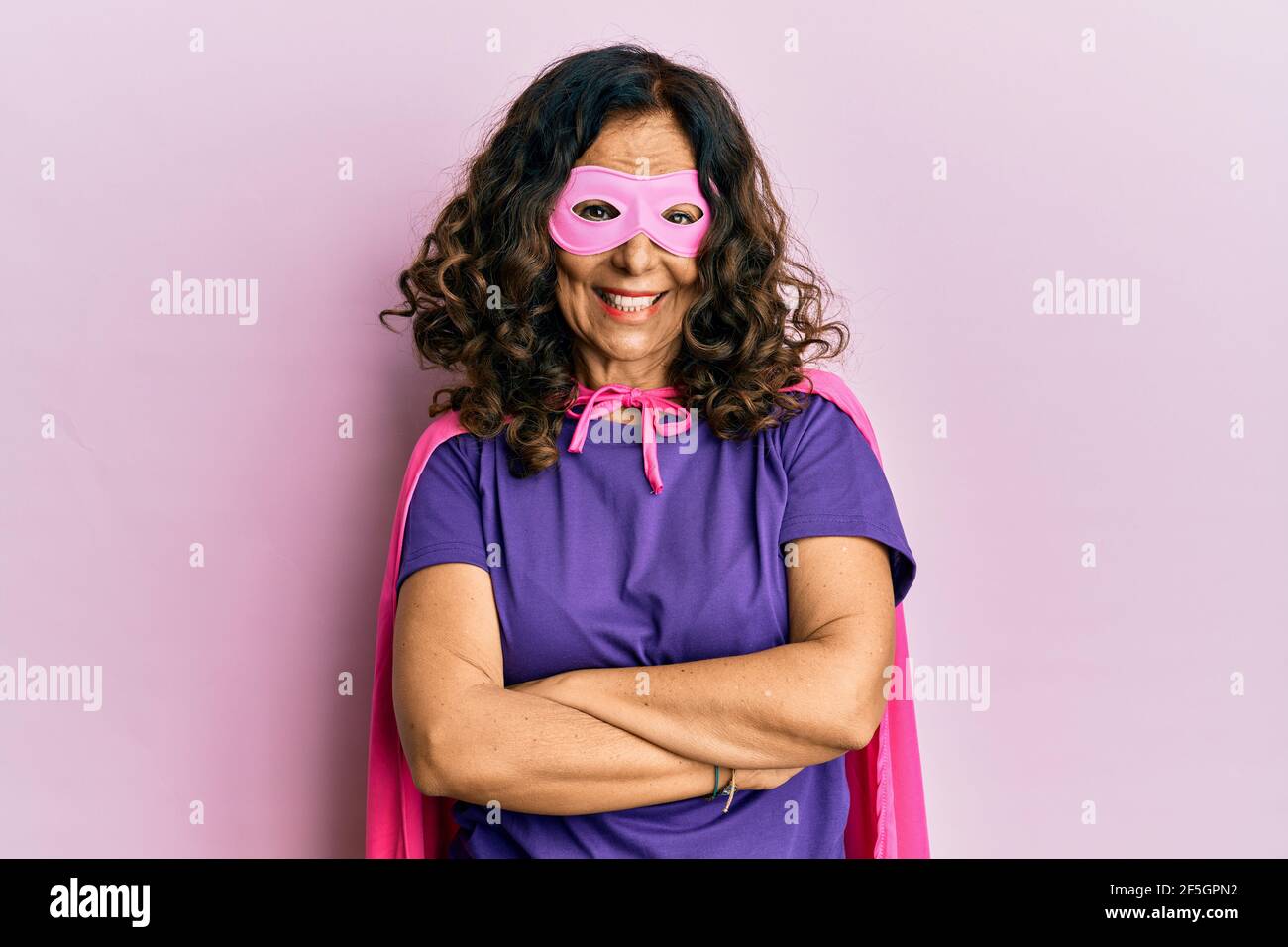 Middle age hispanic woman wearing super hero costume happy face smiling ...