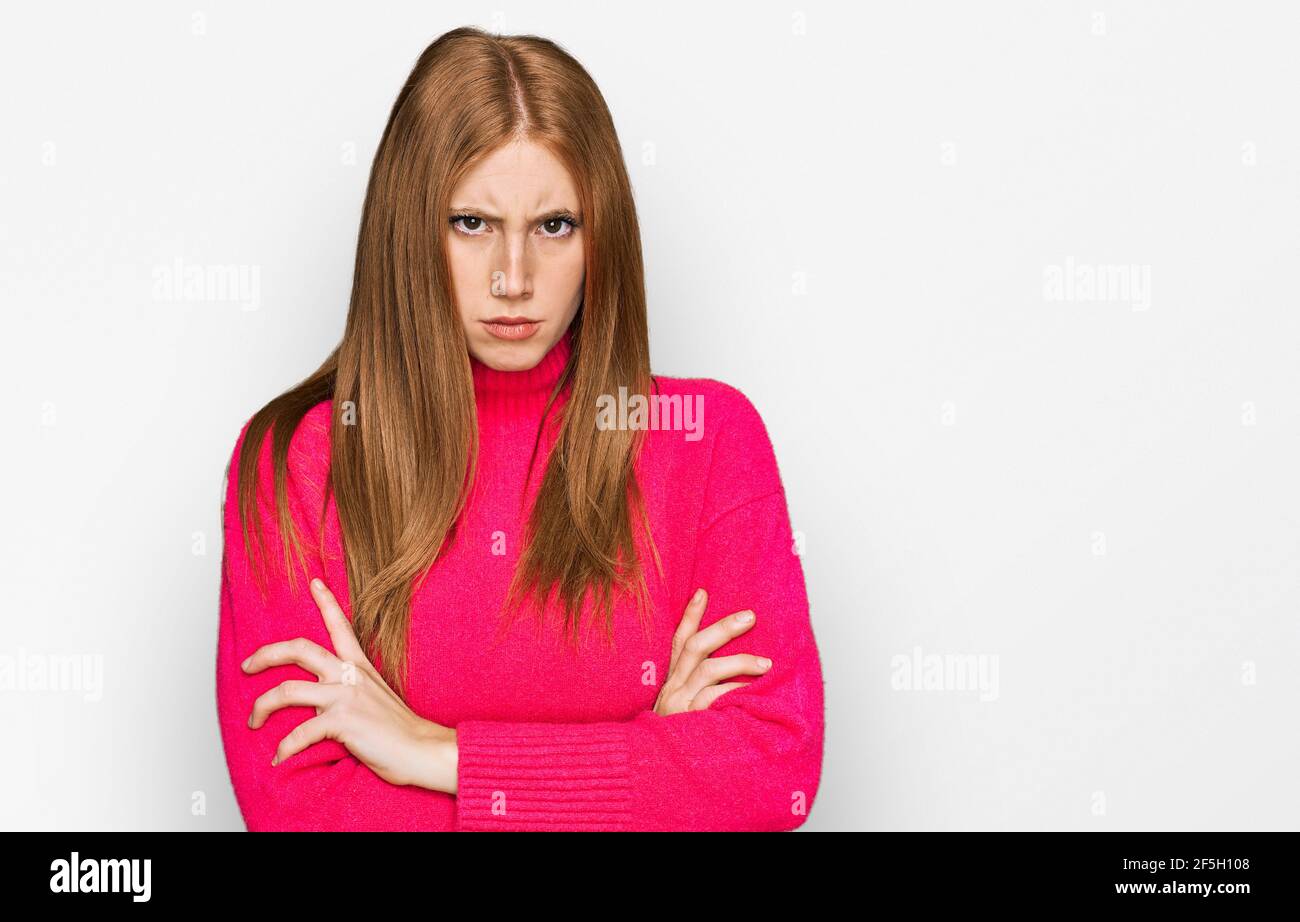 Young irish woman wearing casual clothes skeptic and nervous ...