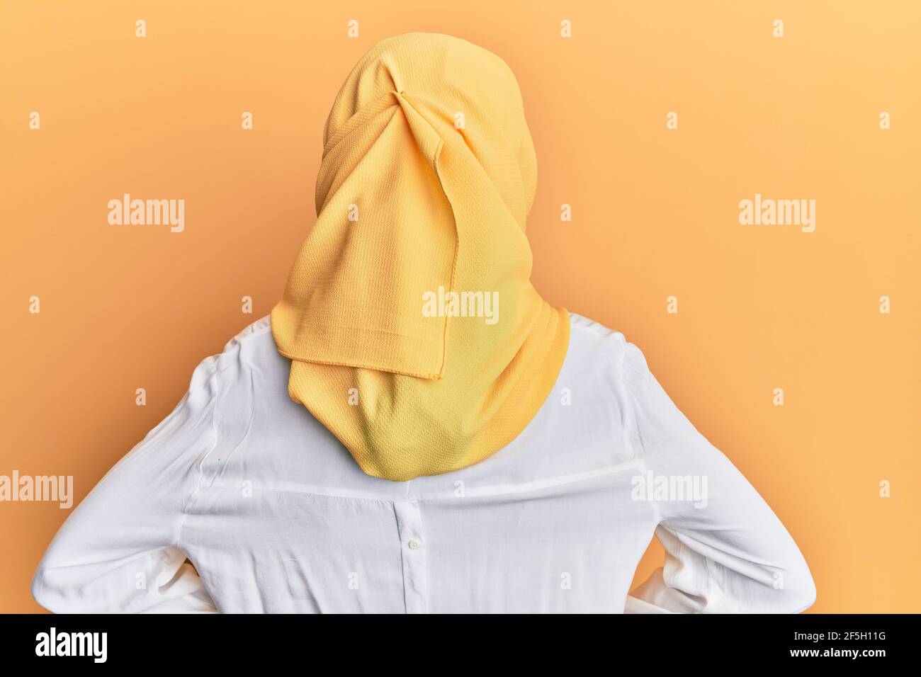 Young brunette arab woman wearing traditional islamic hijab scarf ...