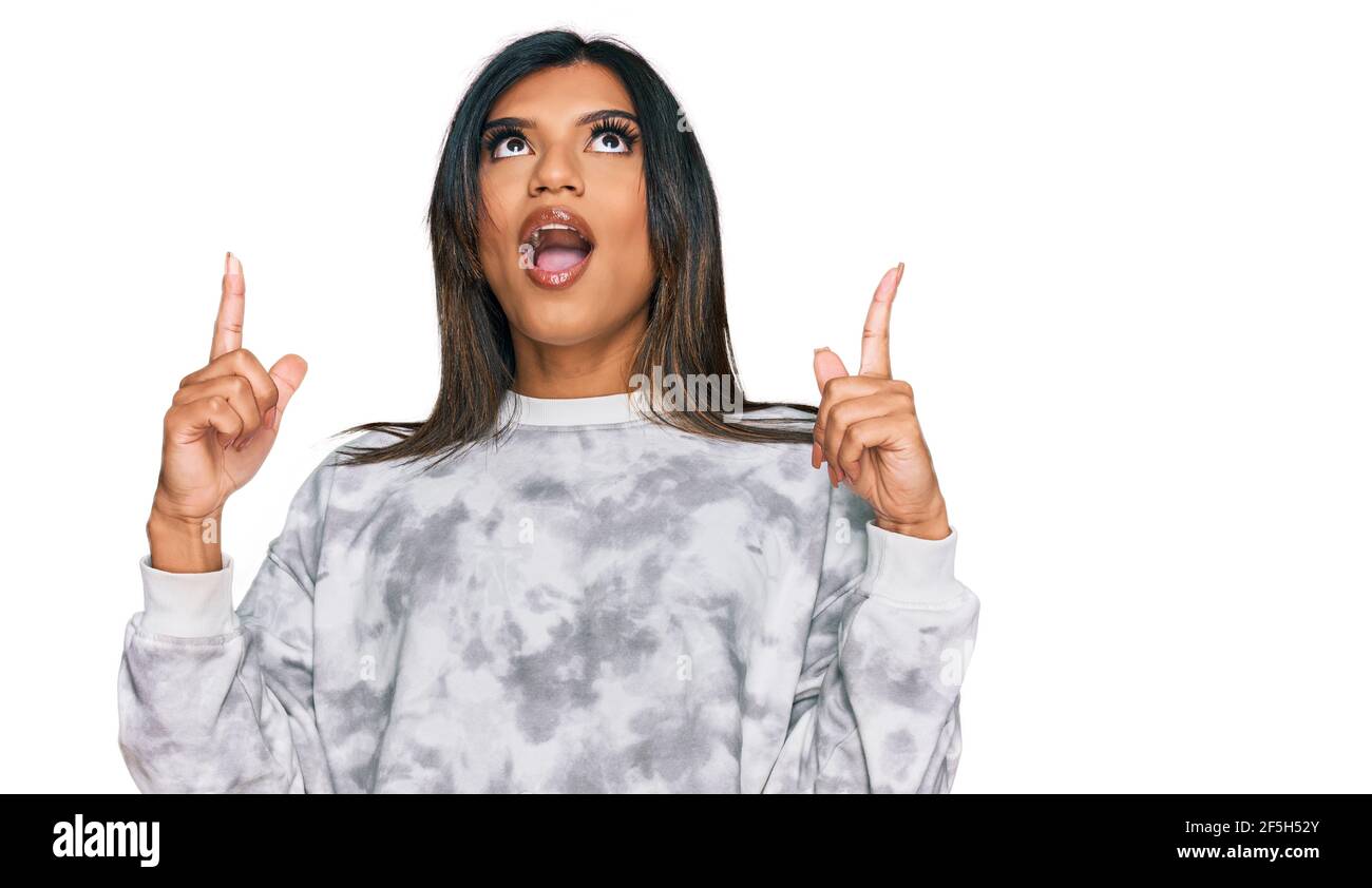 Young Latin Transsexual Transgender Woman Wearing Casual Clothes Amazed