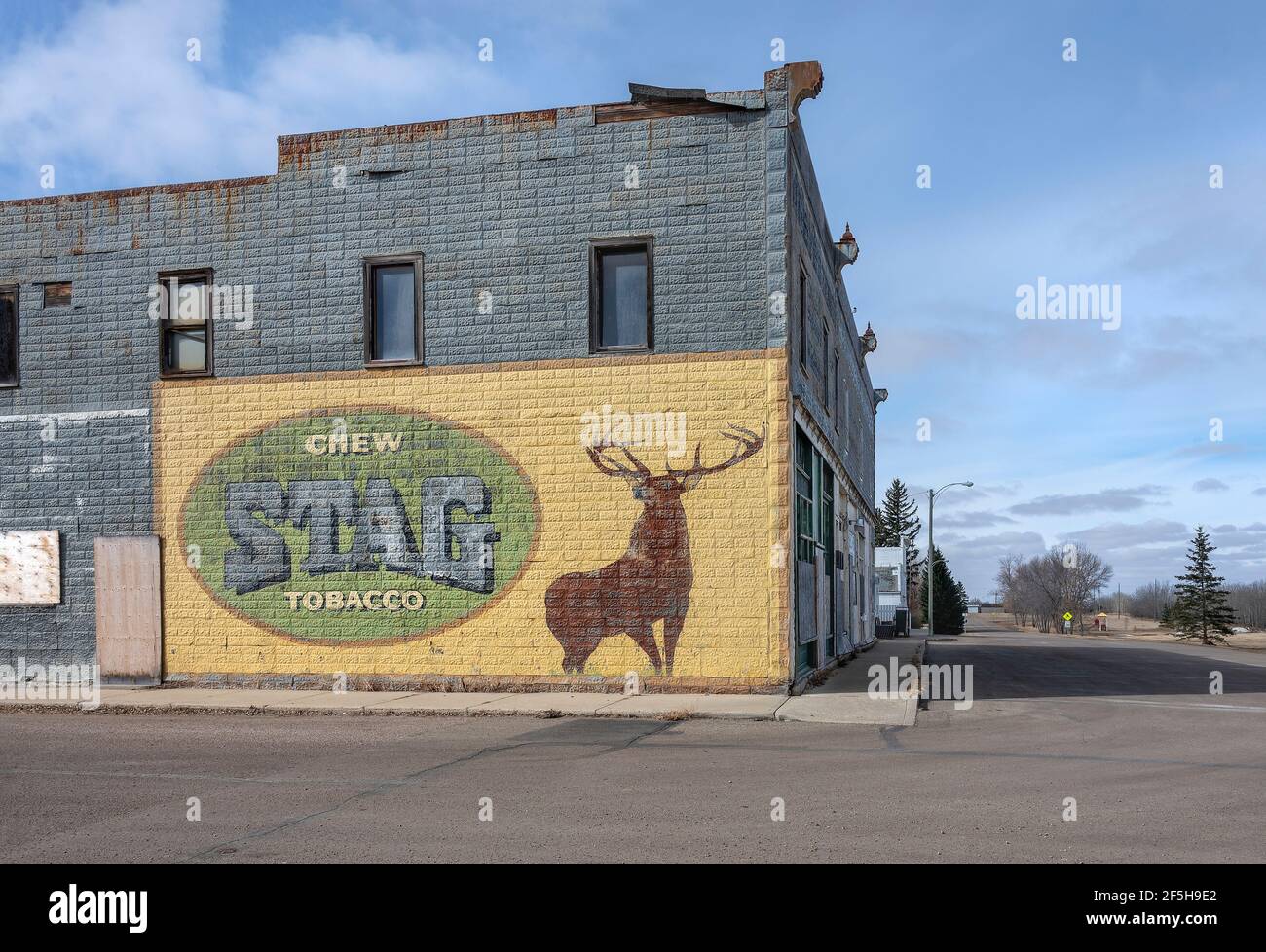 Botha, Alberta, Canada – March 25, 2021: Exterior view of the abandoned ...