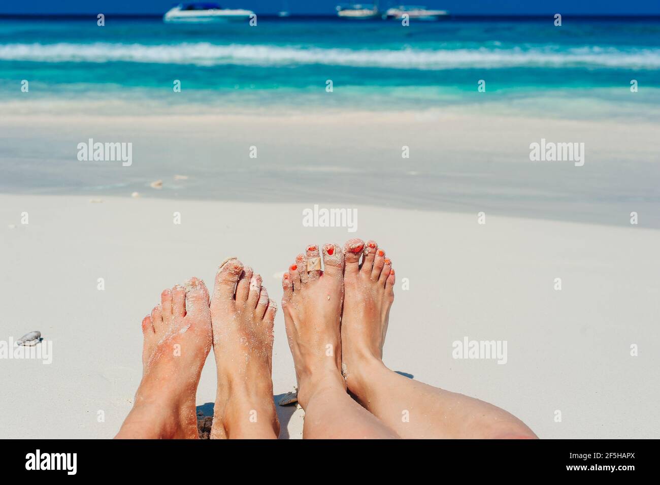 Young woman looking down of view perspective on bare feet standing in ...