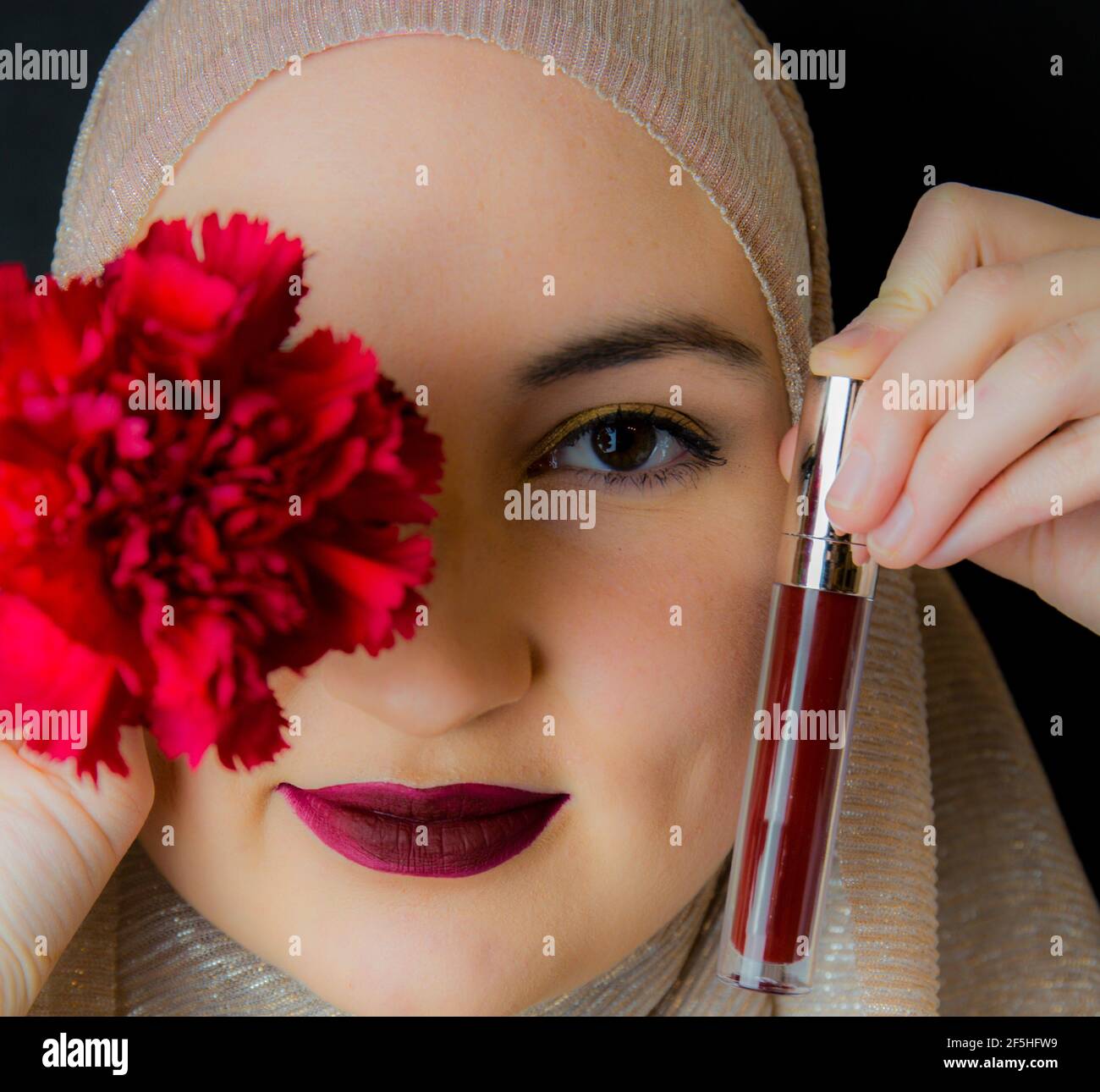 Woman with hijab, professional make-up, showing makeup items, black ...