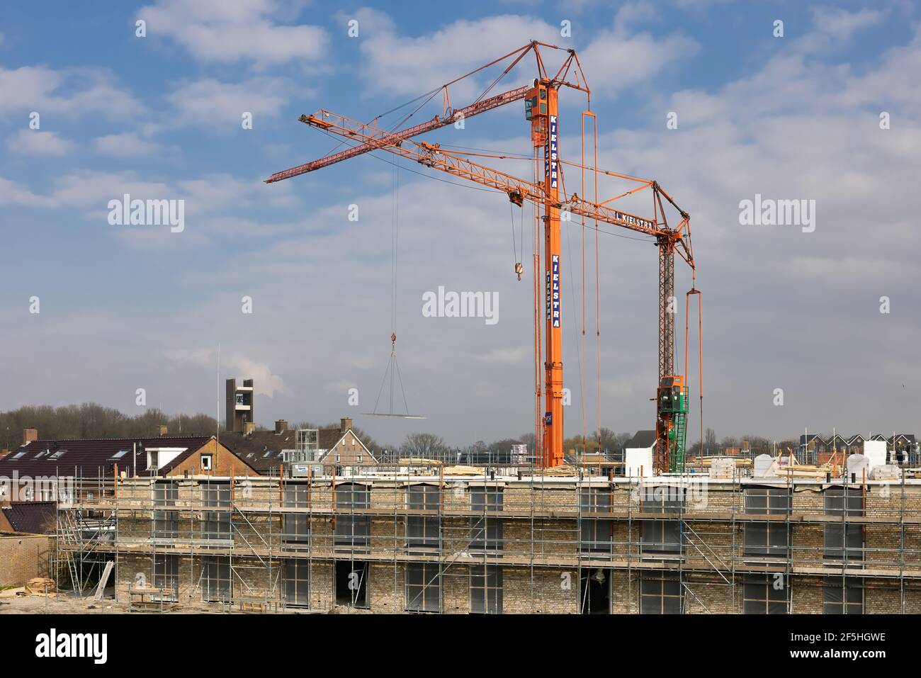 Mobile tower cranes at construction site apartment building Dutch ...