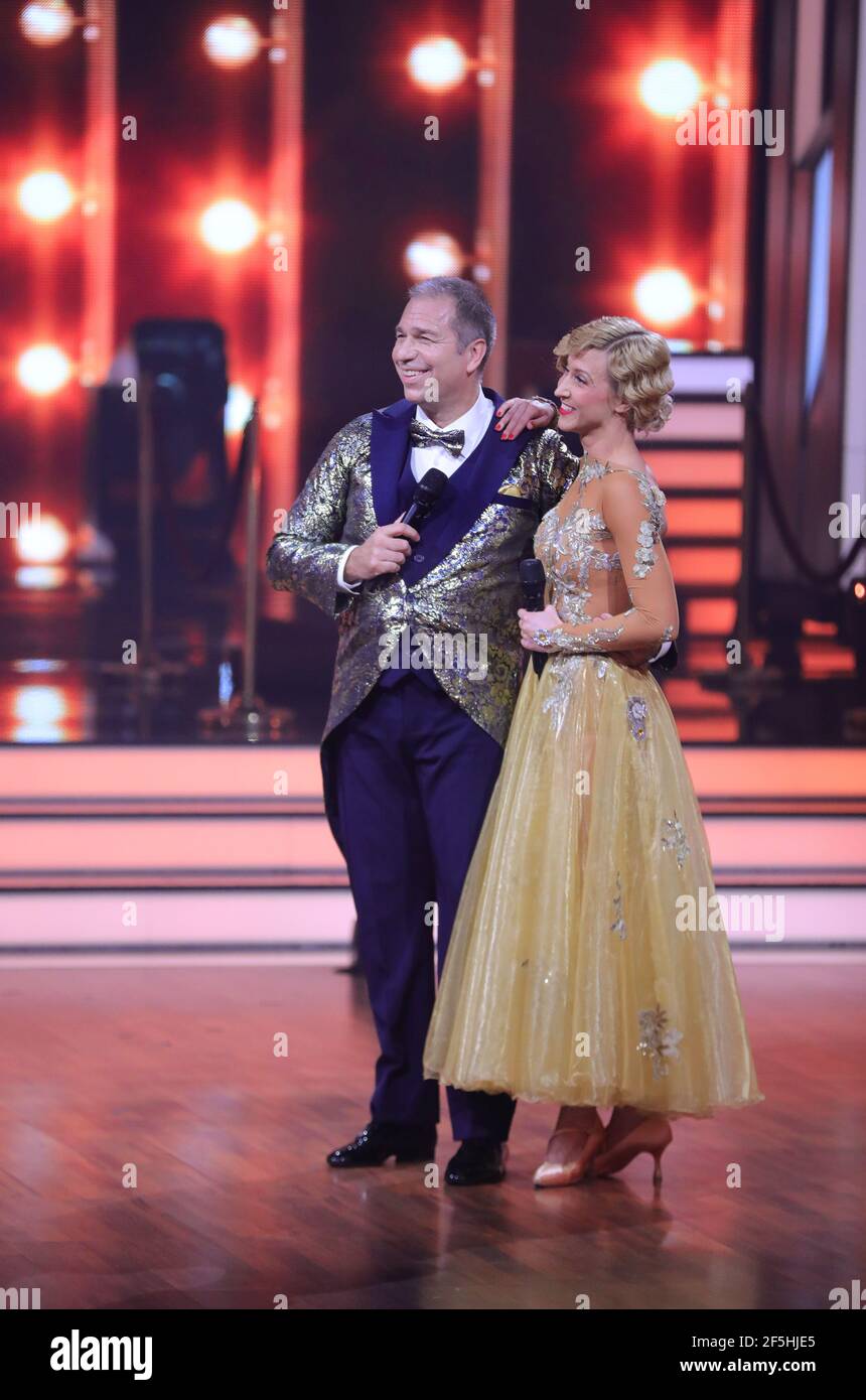 Cologne, Germany. 26th Mar, 2021. Sports reporter Kai Ebel and ...