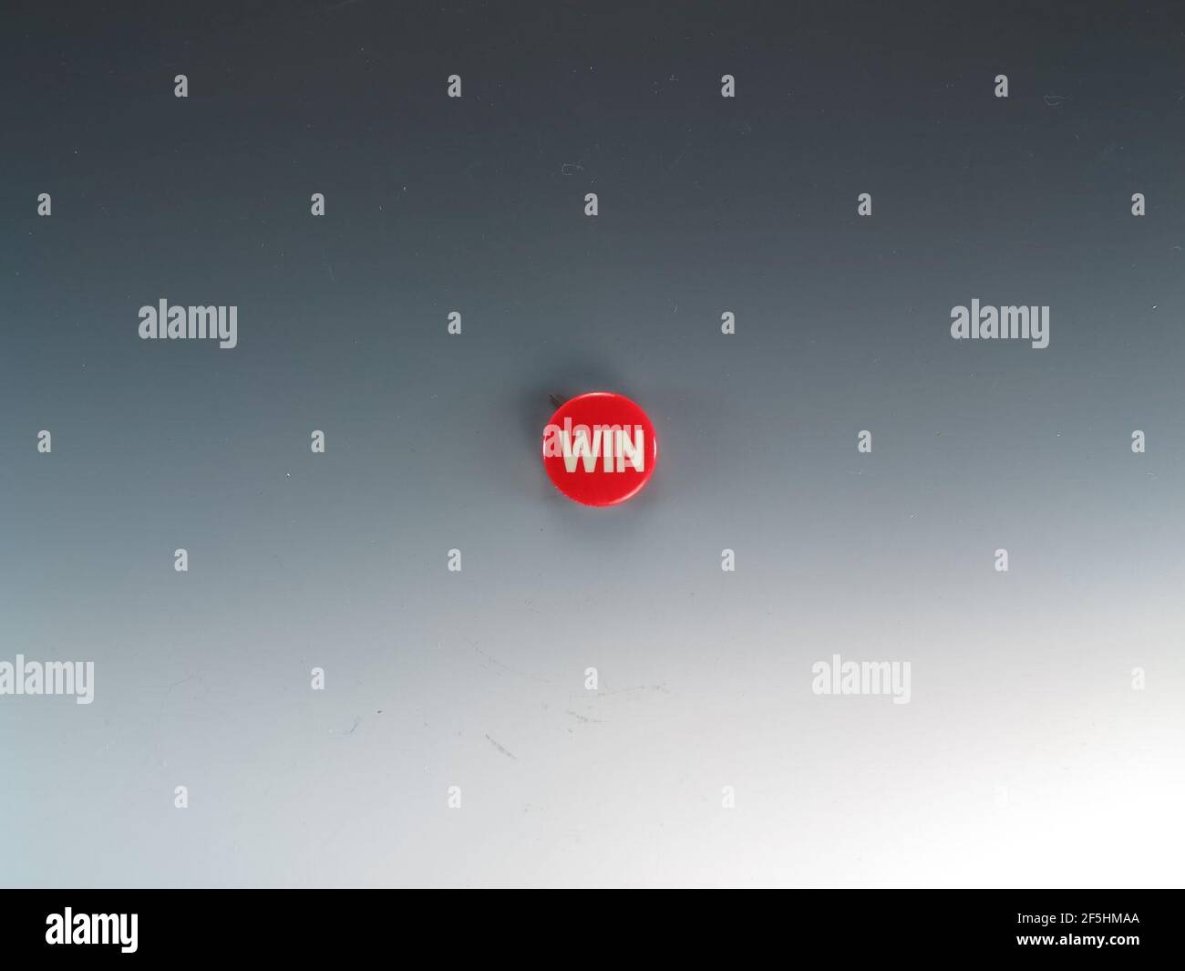 Red and white ''WIN'' button Stock Photo - Alamy