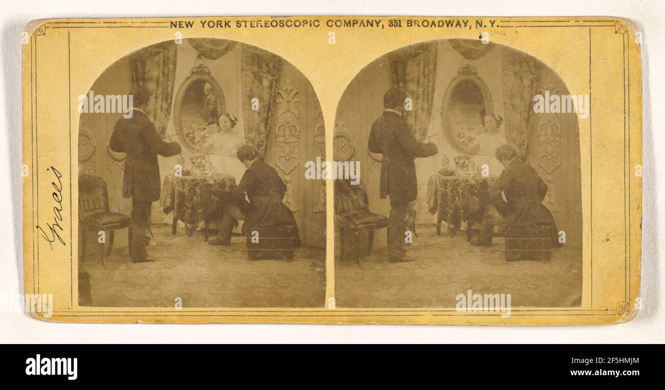 Parlor scene: two men with a woman at her dressing table. New York ...