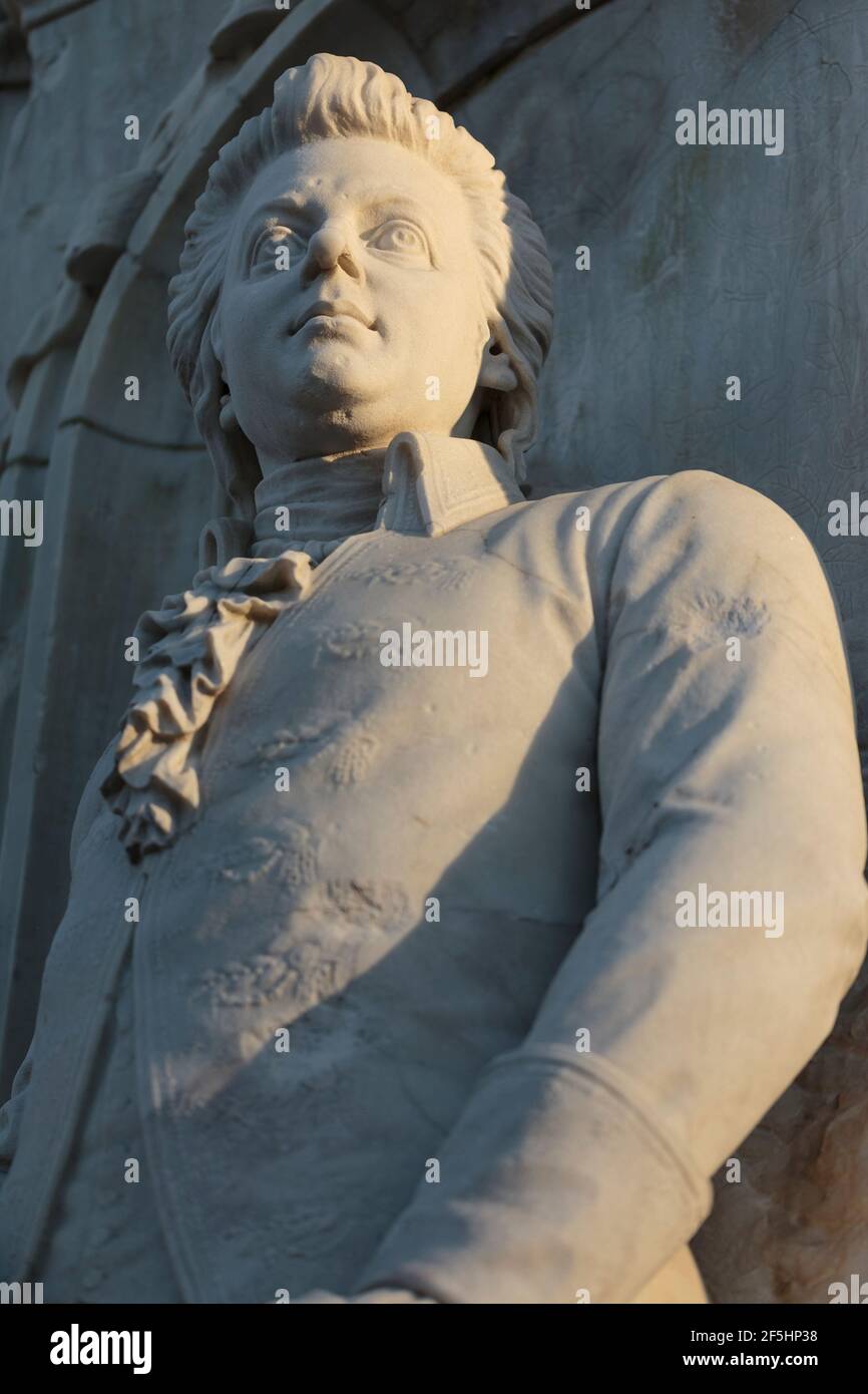 Stone figure of musical genius, composer Wolfgang Amadeus Mozart, in a ...