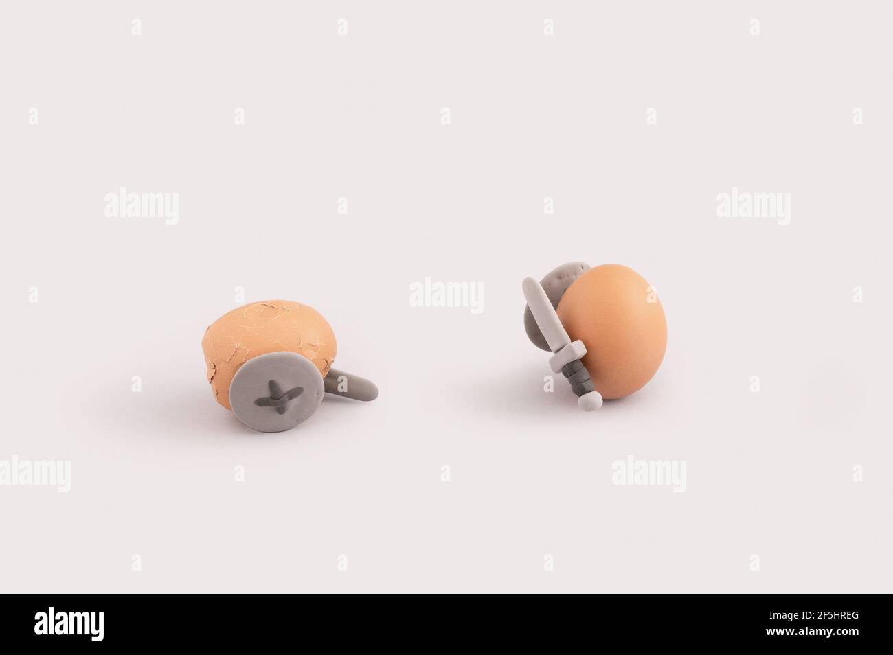 Easter eggs having a sword fight with swords and shields - Creative ...