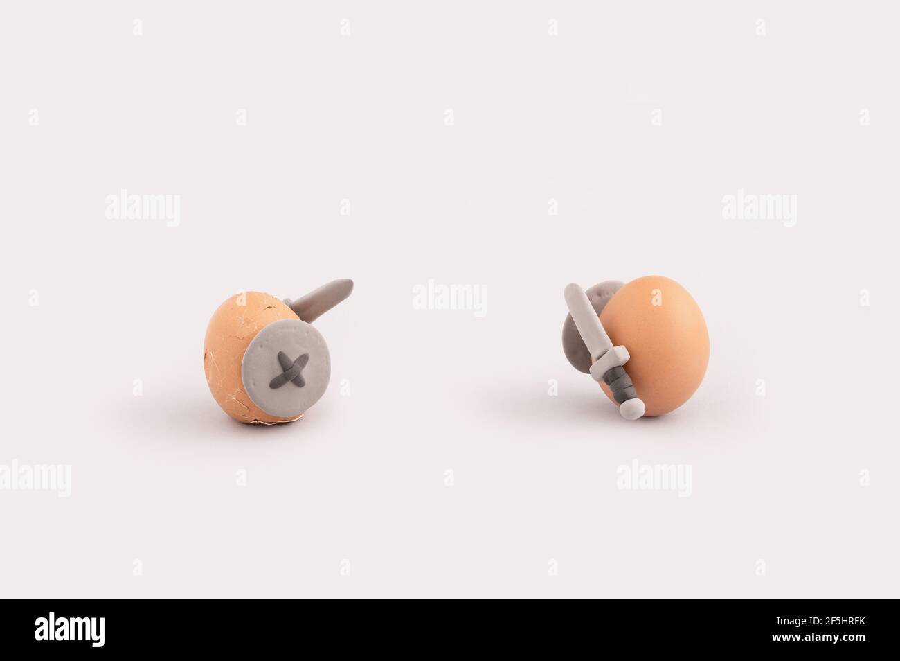 Easter eggs having a sword fight with swords and shields - Creative ...