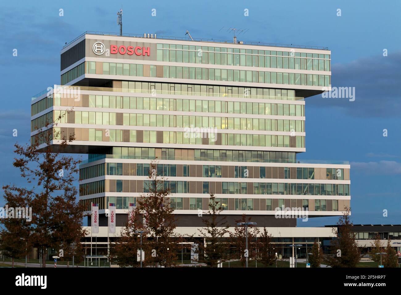 Berlin, Germany 09/17/2020 A white Tesla electric car charges in one of ...