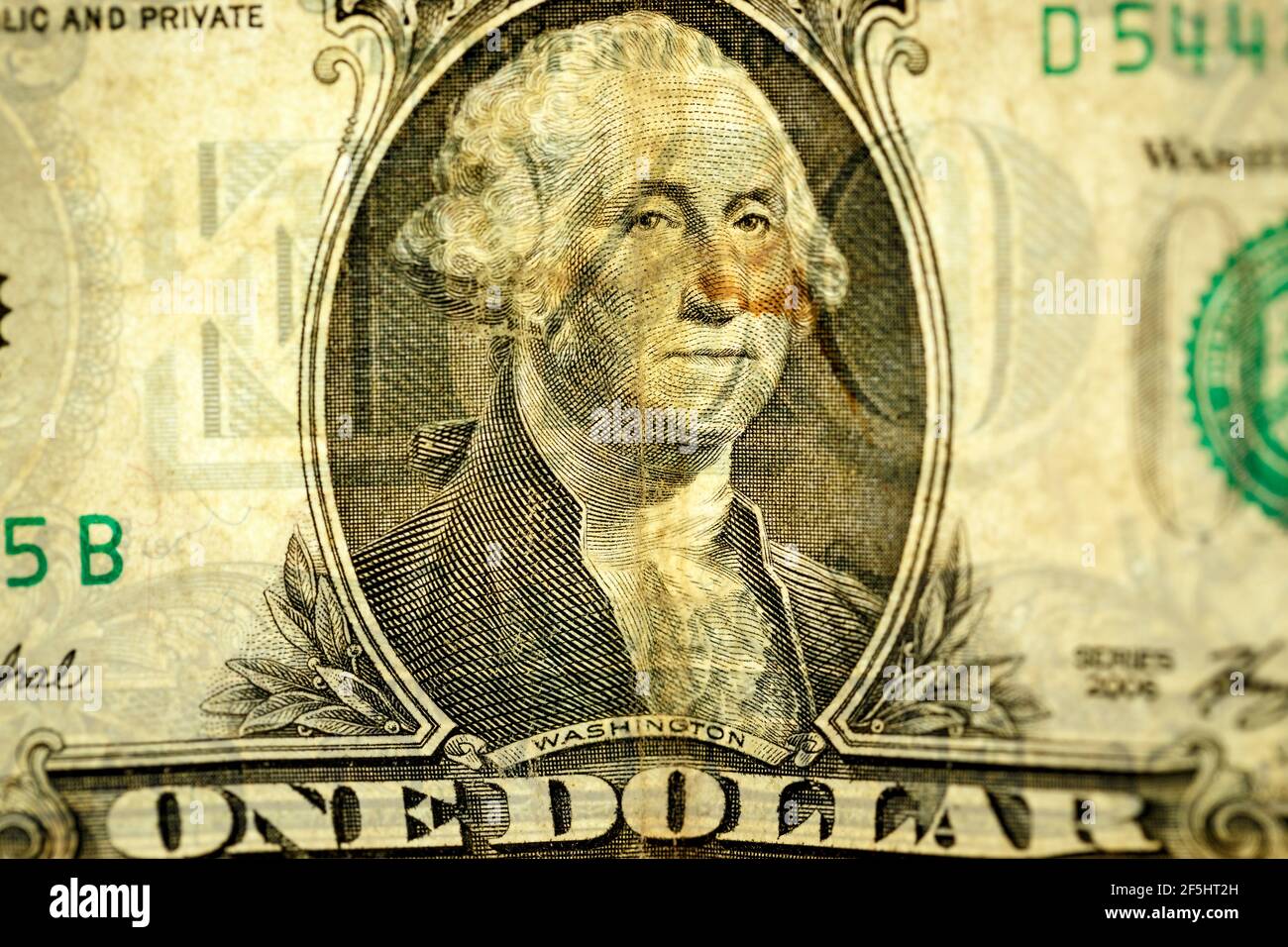 Horizontal macro of front side of old worn one dollar bill with ...