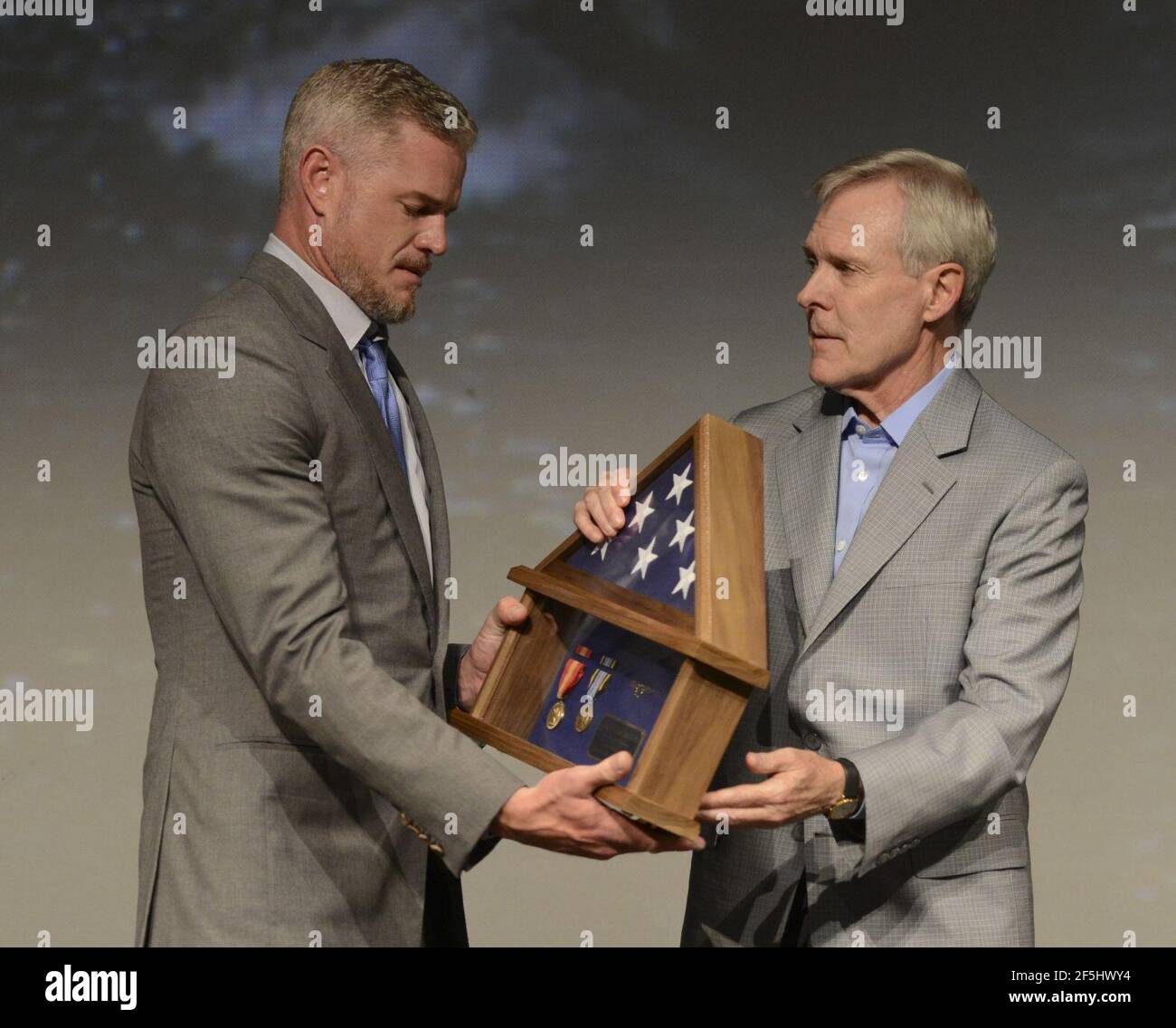 Ray Mabus presents actor Eric Dane a shadow box representing his father ...