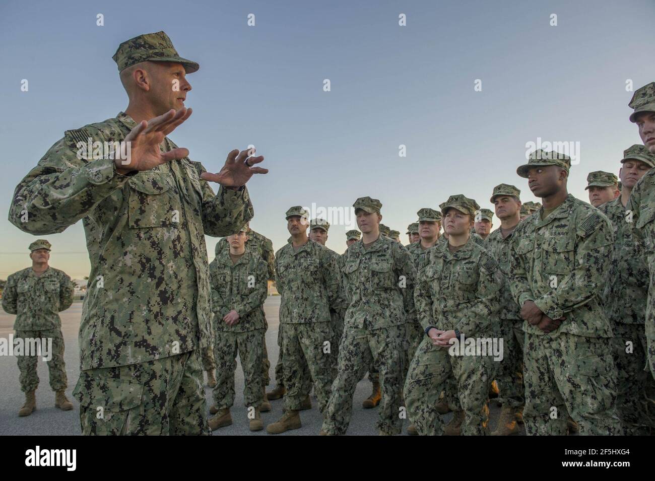 Rear Adm. Darren Hanson speaks with Seabees from Naval Mobile ...